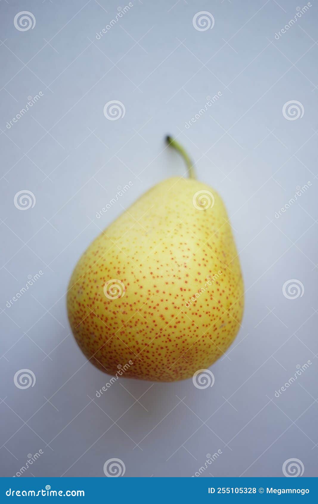 Yellow Orange Pear on a White Sunny Table Stock Photo - Image of health ...