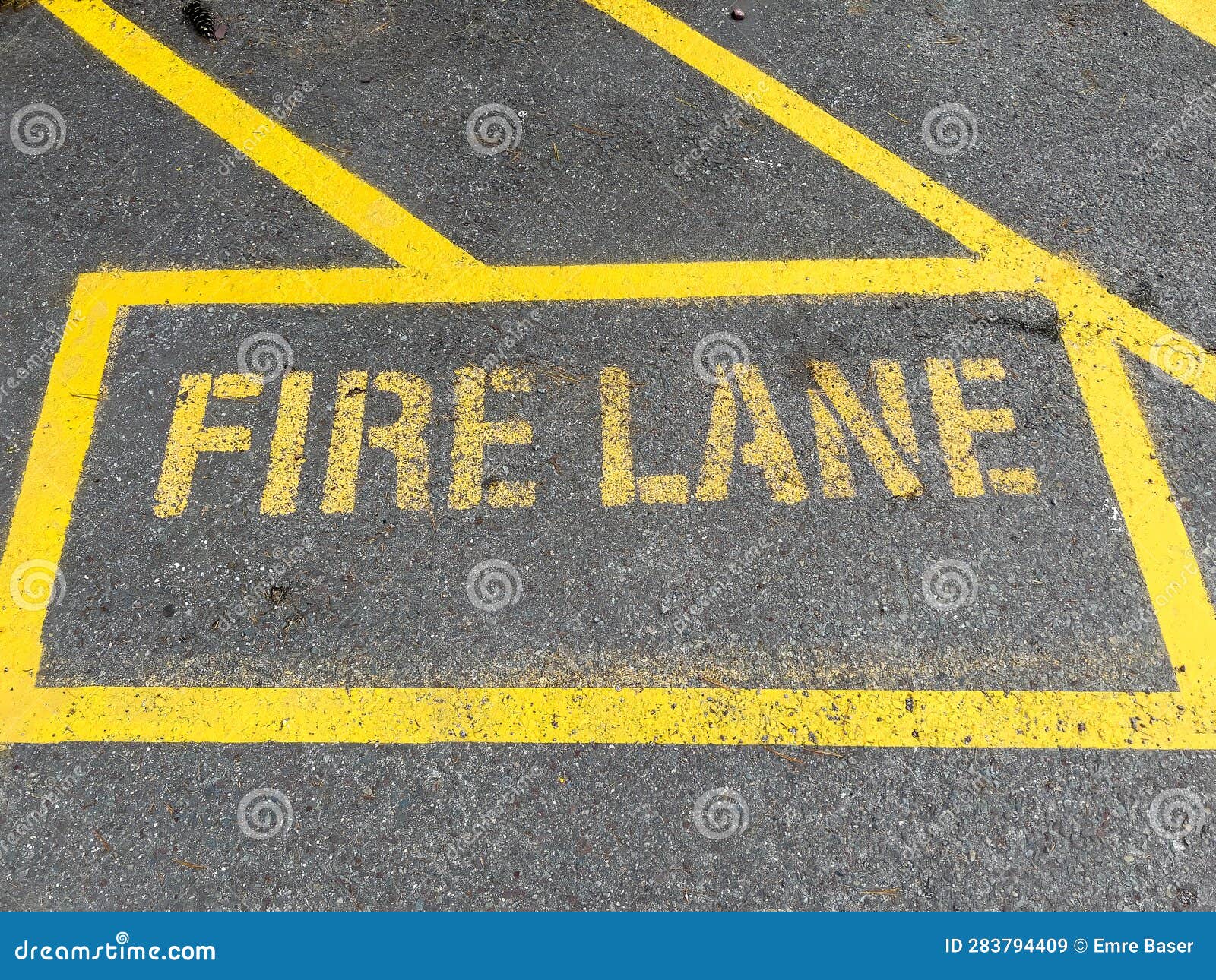 Yellow Paint Fire Lane Stencil Stock Image - Image of curb, asphalt ...