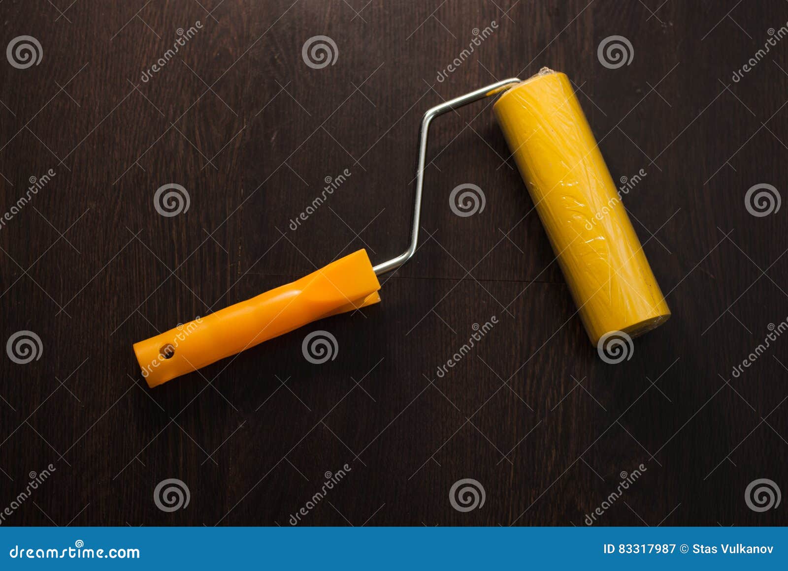 Yellow Paint Roller on a Dark Background Stock Image - Image of plastic ...
