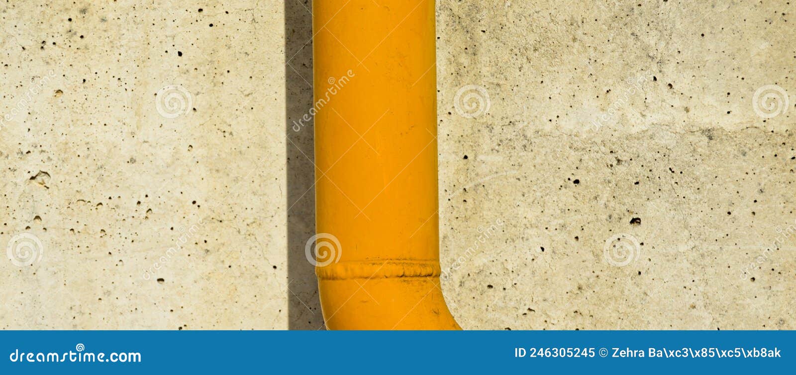 Yellow Metal Pipe on Unplastered Concrete Stock Image - Image of ...