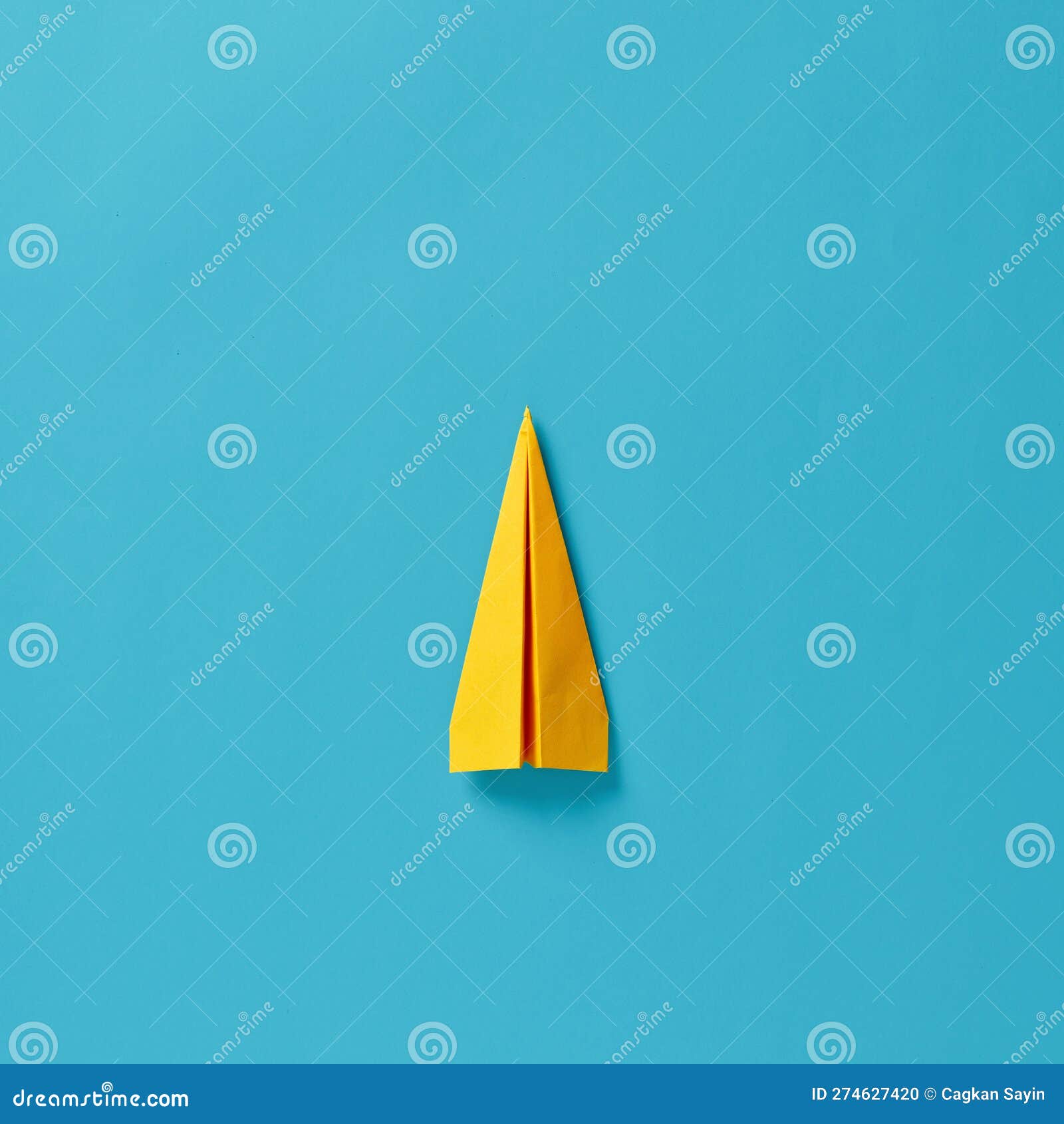 Yellow Paper Airplane on Blue Background. Top View Stock Photo - Image ...