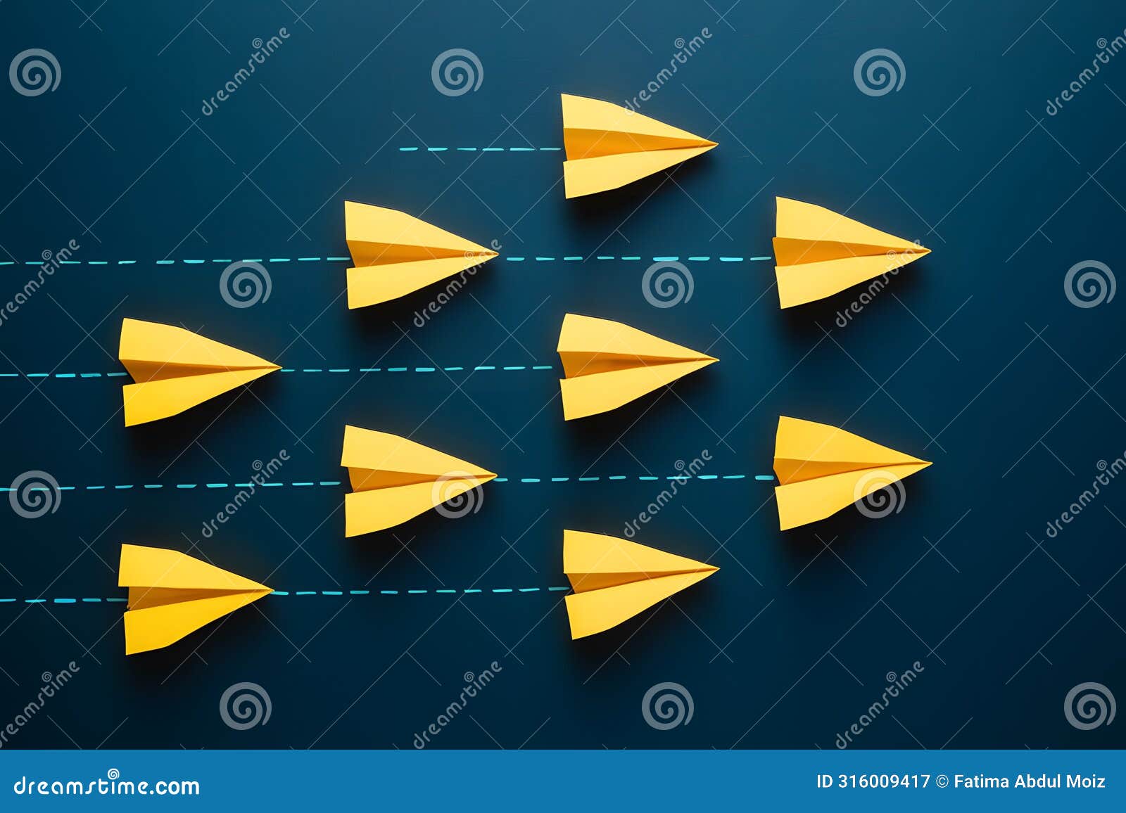 Yellow Paper Airplanes Form a Cohesive Pattern Against a Vibrant Blue ...