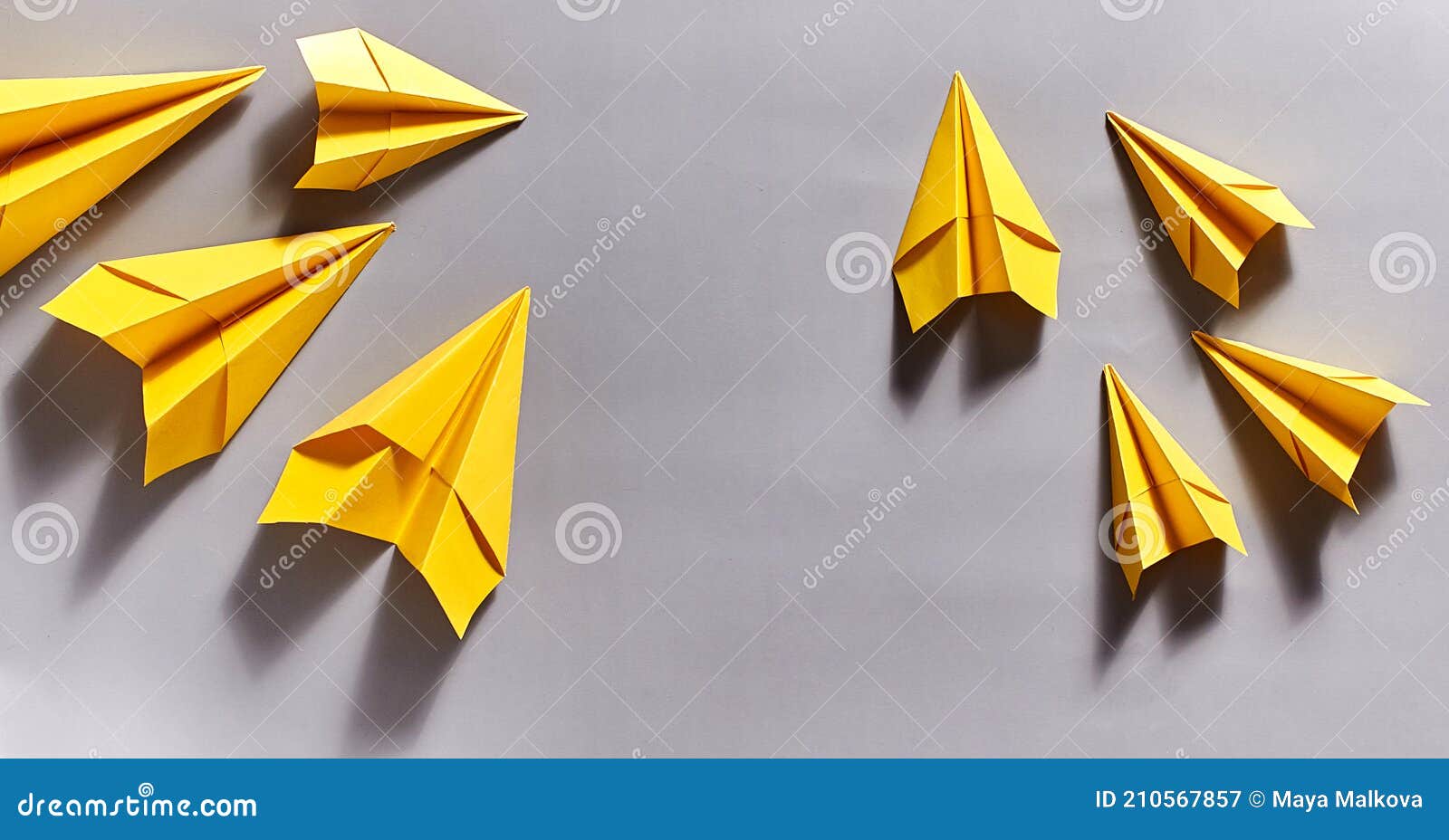 Yellow Paper Airplanes on Gray Background. Close-up, Copy Space Stock ...