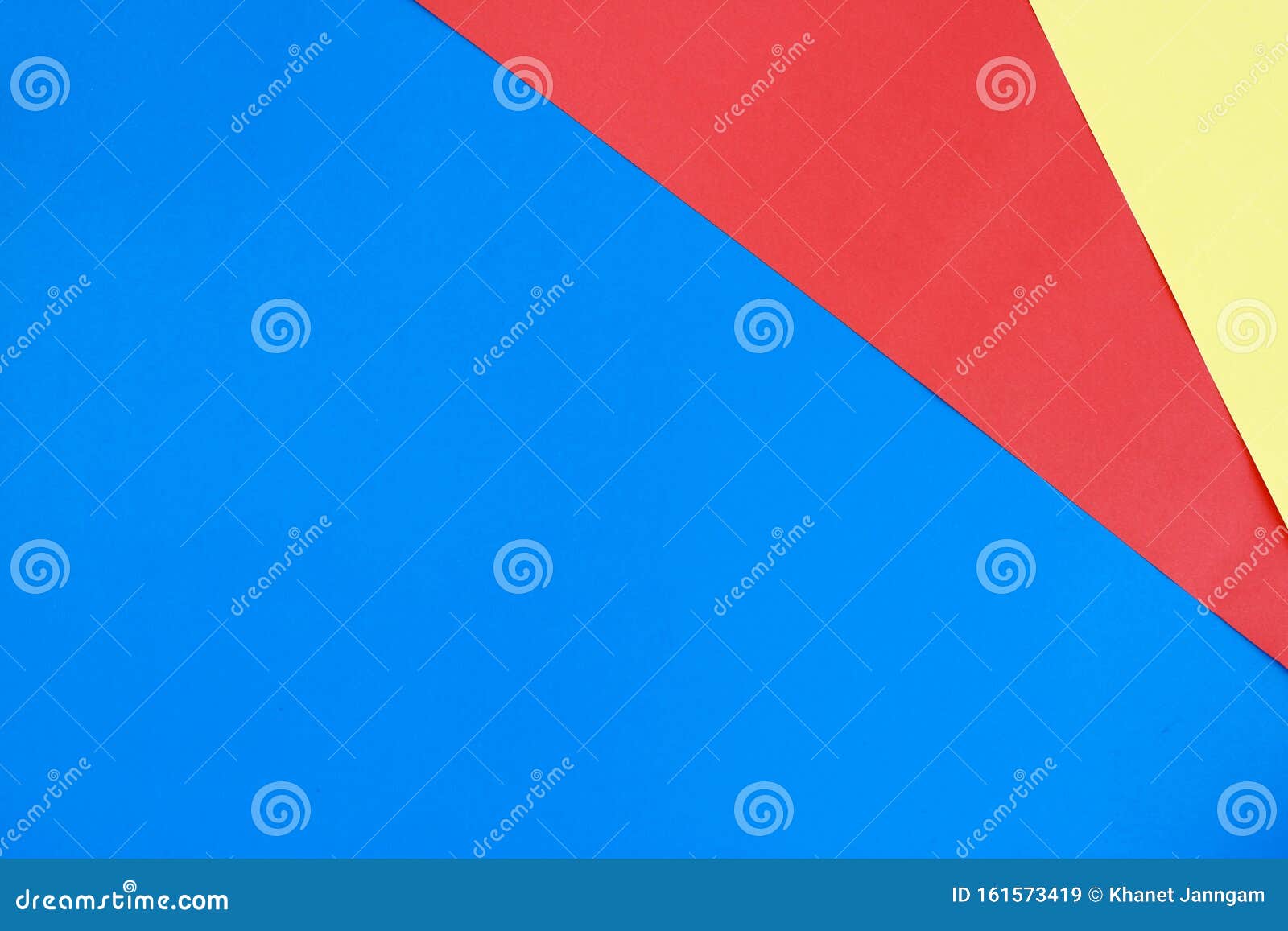 Yellow paper, blue and red stock image. Image of soft - 161573419