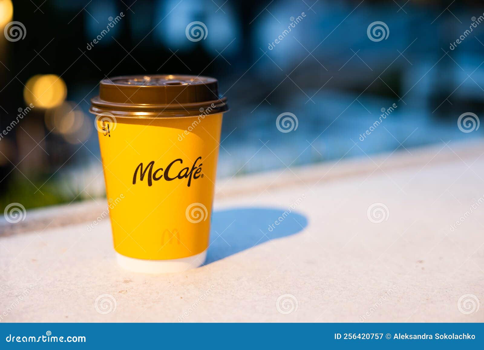 A Yellow, Paper Glass from McDonald S in the Evening Light. Editorial ...