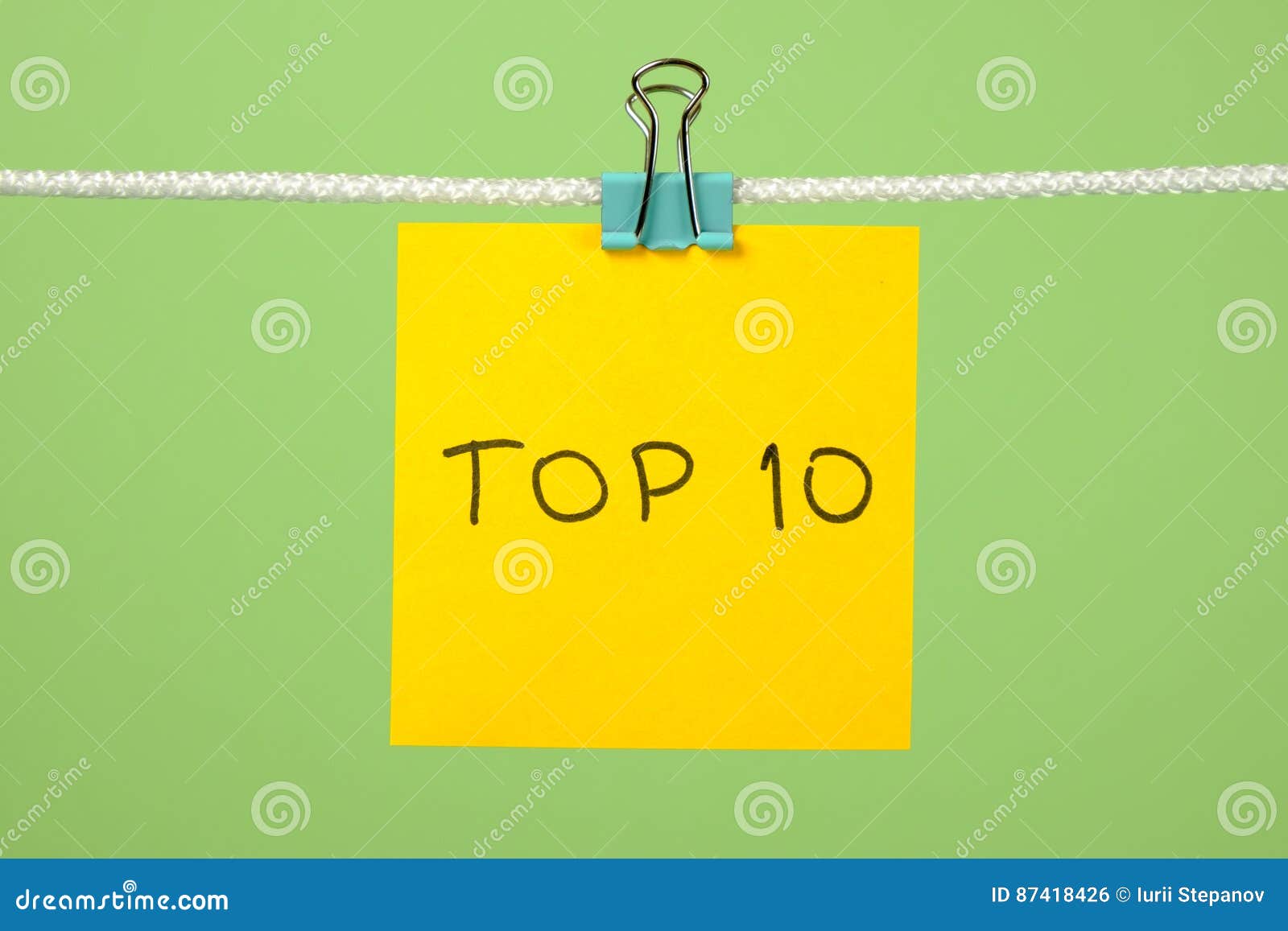 Yellow Paper Sheet on the String with Text Top 10 Stock Photo - Image ...