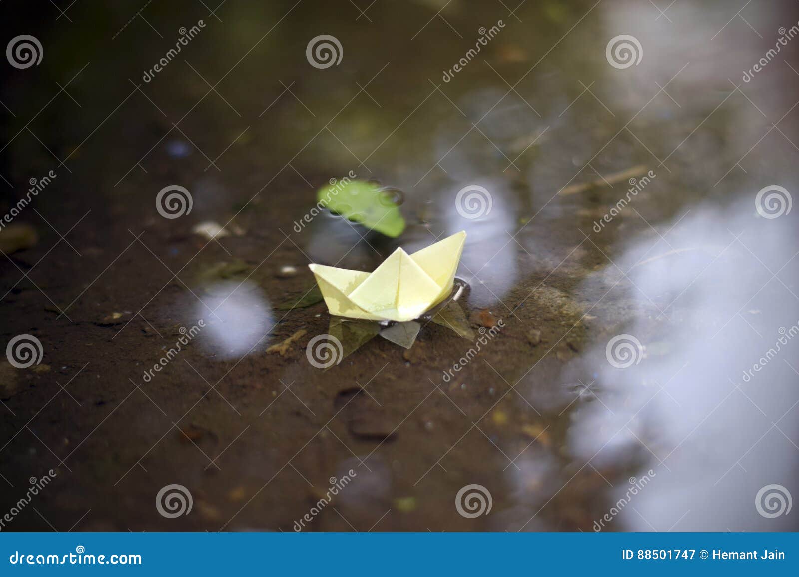 Yellow paperboat on river stock image. Image of paperboat - 88501747