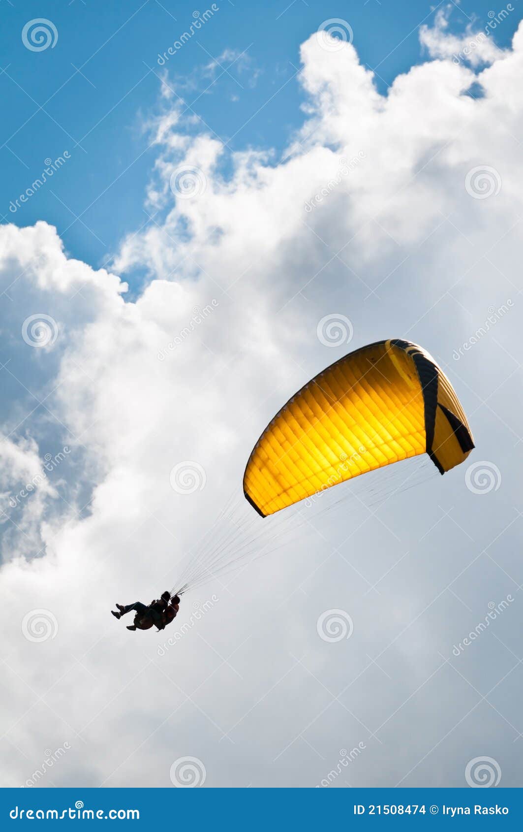 Yellow Parachute Against Sky and Clouds Stock Photo - Image of airborne ...