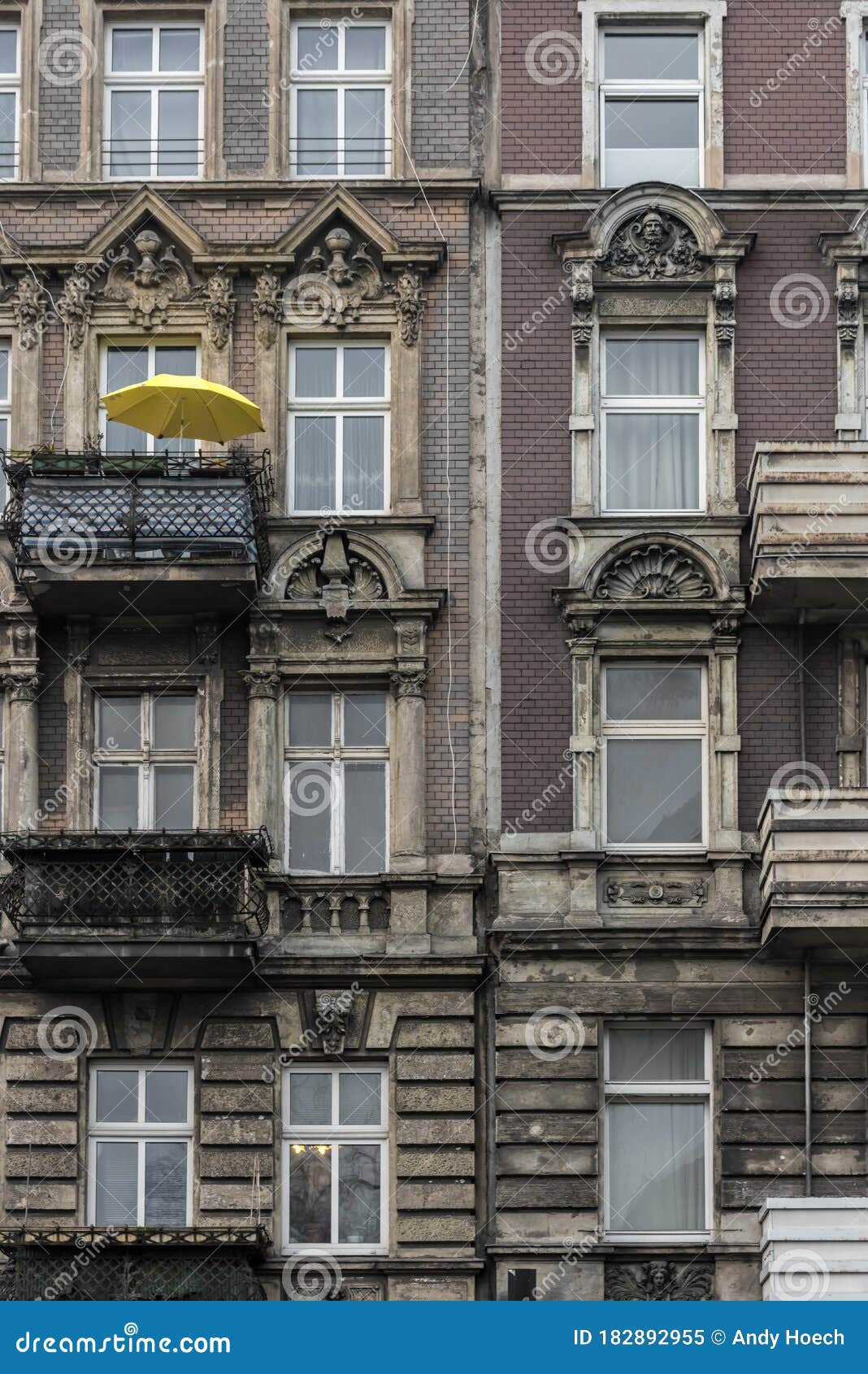 Yellow Parasol on a Balcony of an Old Building Stock Image - Image of ...
