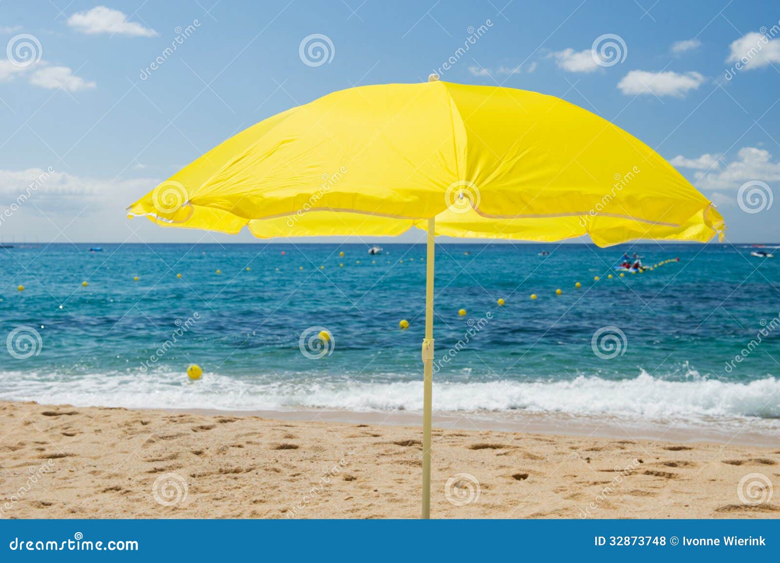 Yellow parasol stock photo. Image of landscape, brava - 32873748