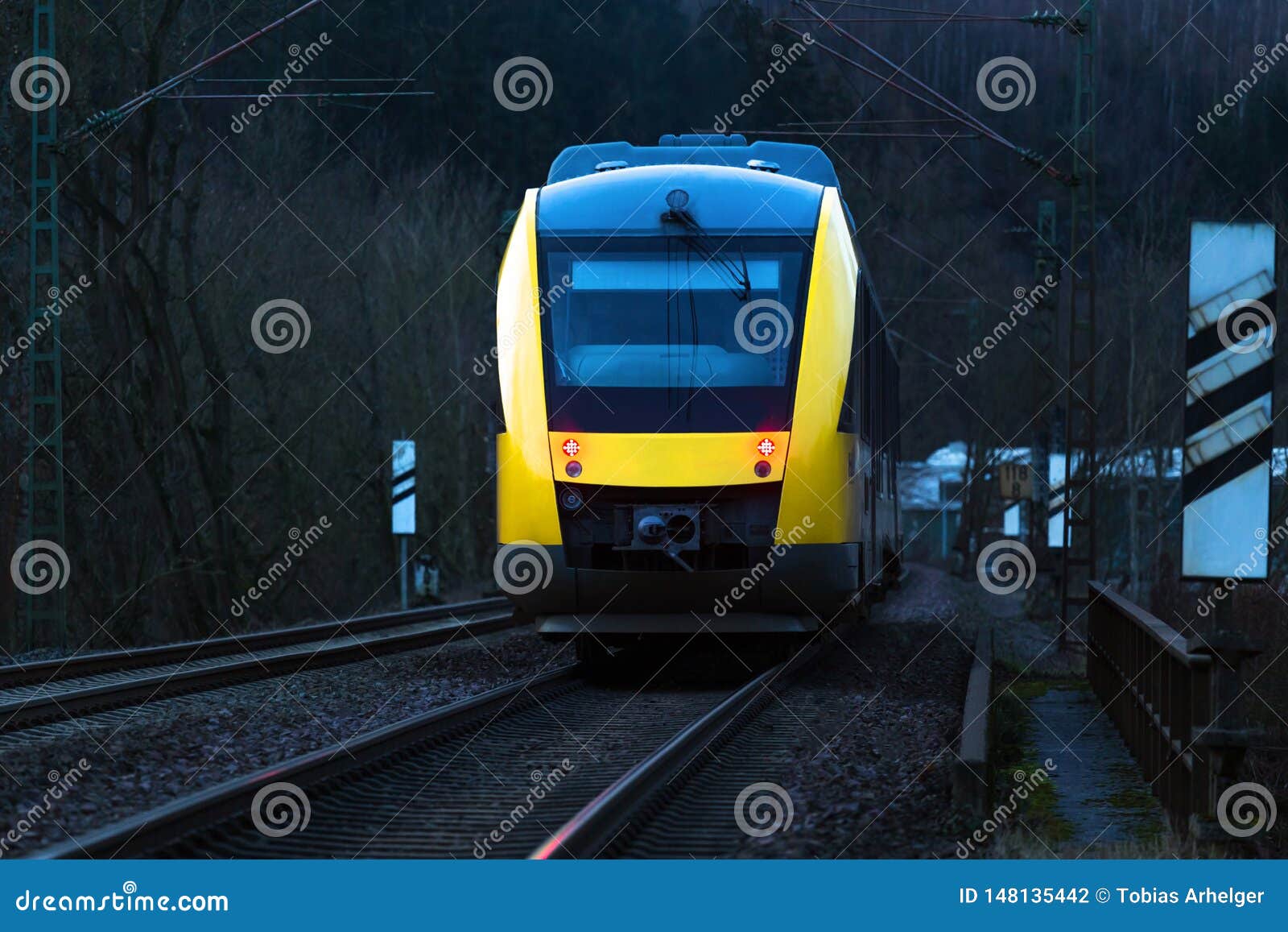 Yellow Passenger Train in the Evening Stock Photo - Image of passenger ...