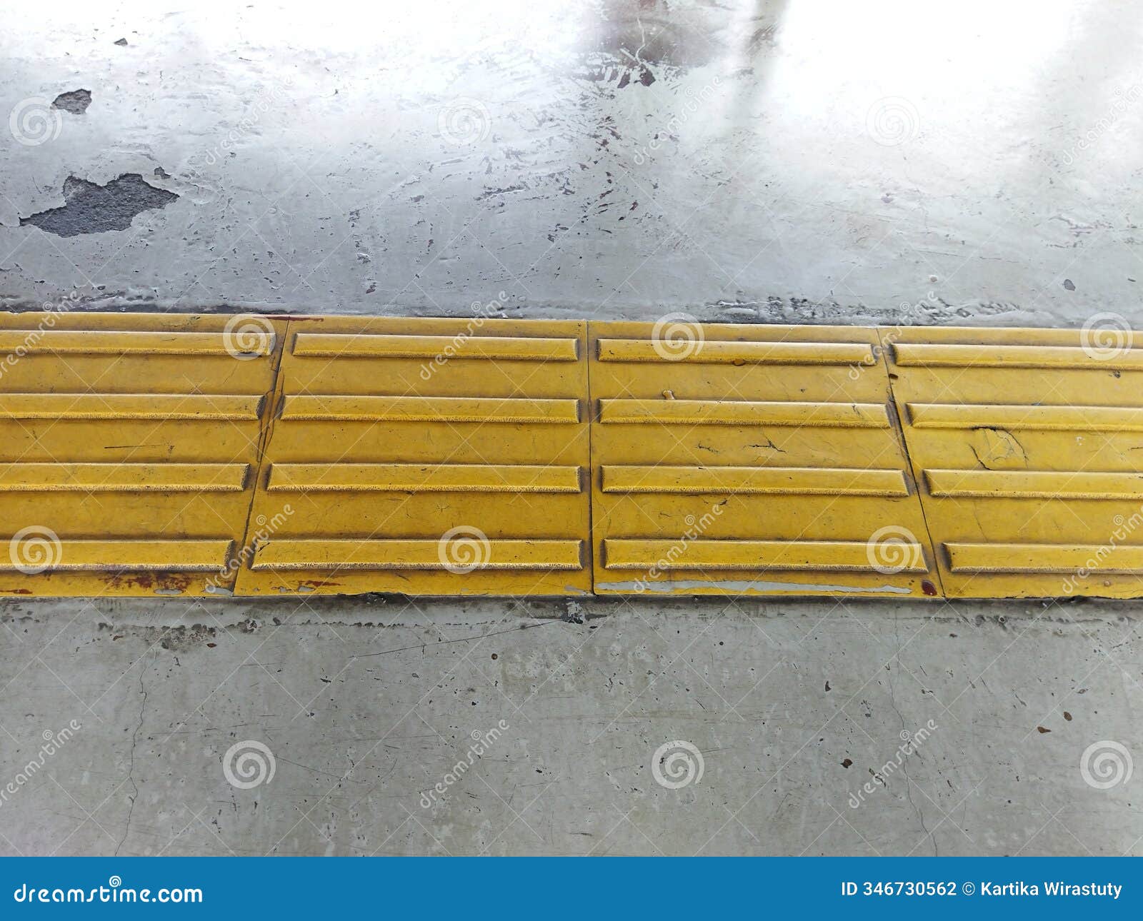 Yellow Path Made for Disabilities at a Bus Stop Stock Photo - Image of ...