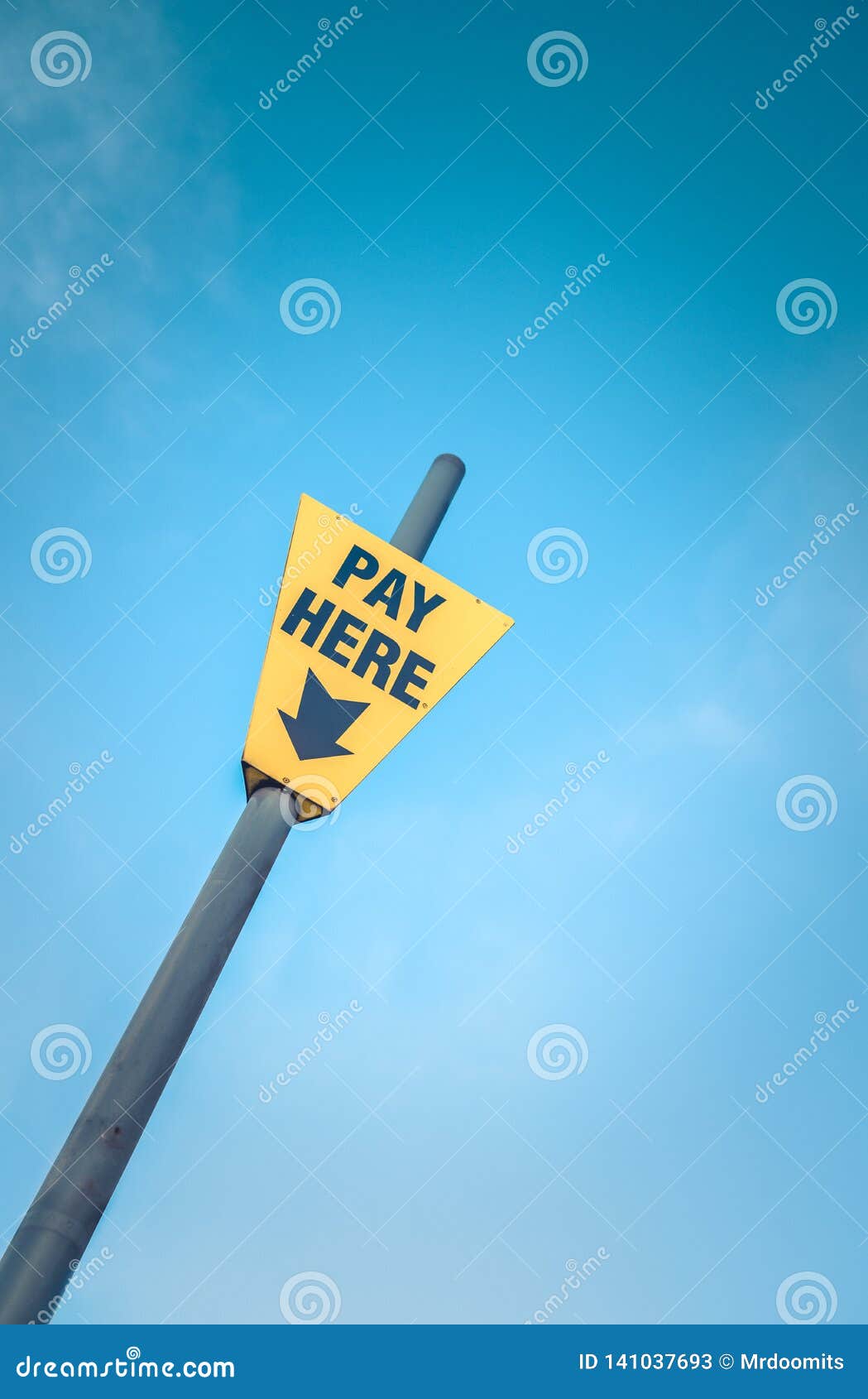 Yellow Pay Here Sign stock image. Image of composition - 141037693