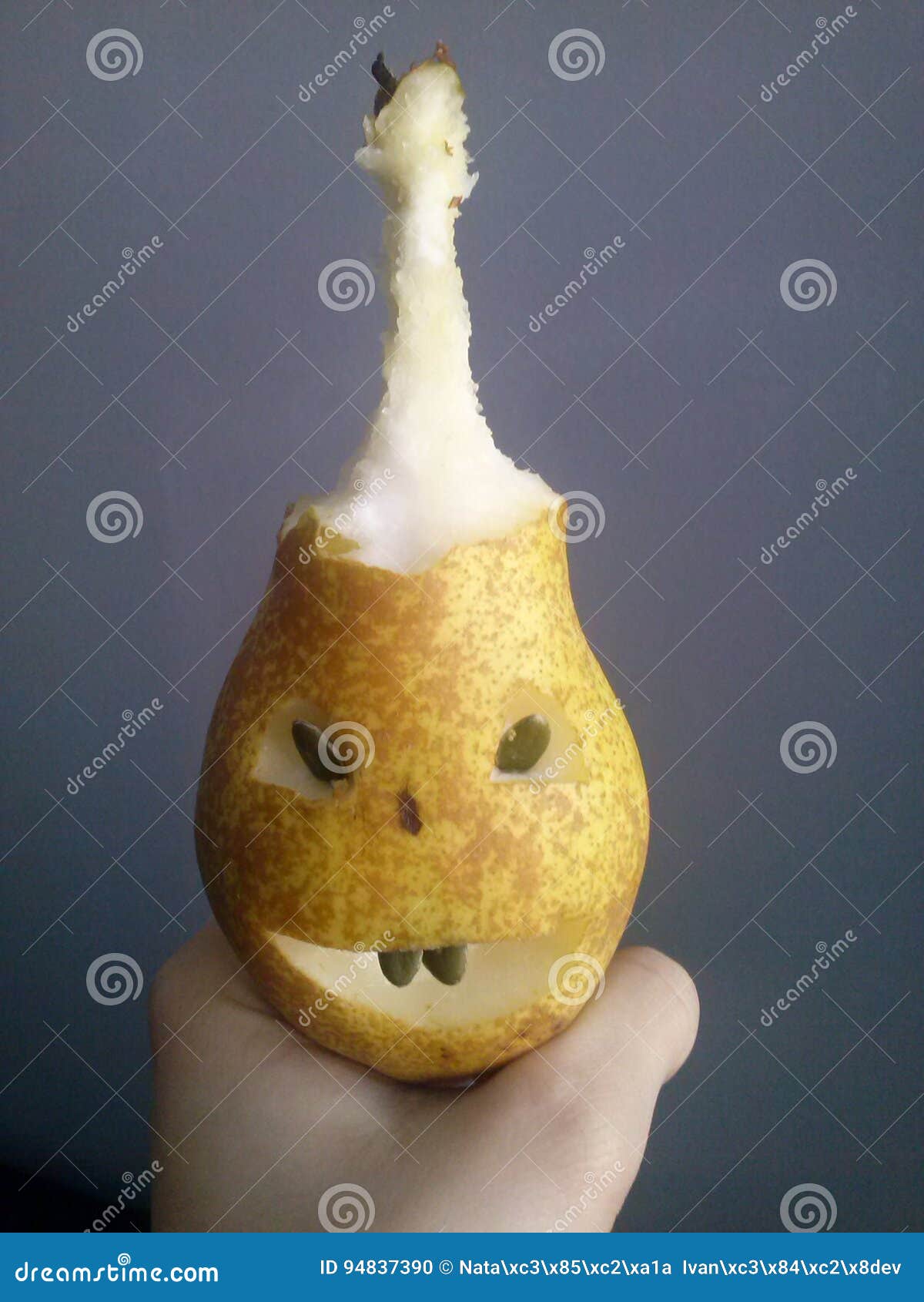 Yellow Pear with a Face in the Girl`s Hand Stock Photo - Image of eyes ...