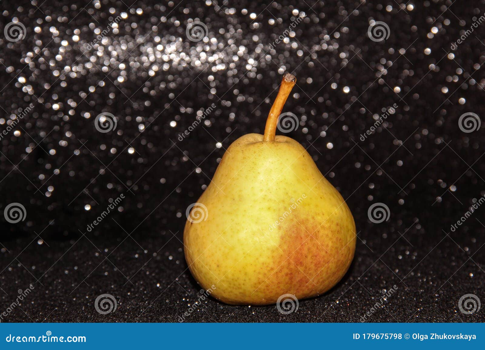 Yellow Pear on a Shiny Black Background Stock Photo - Image of yellow ...