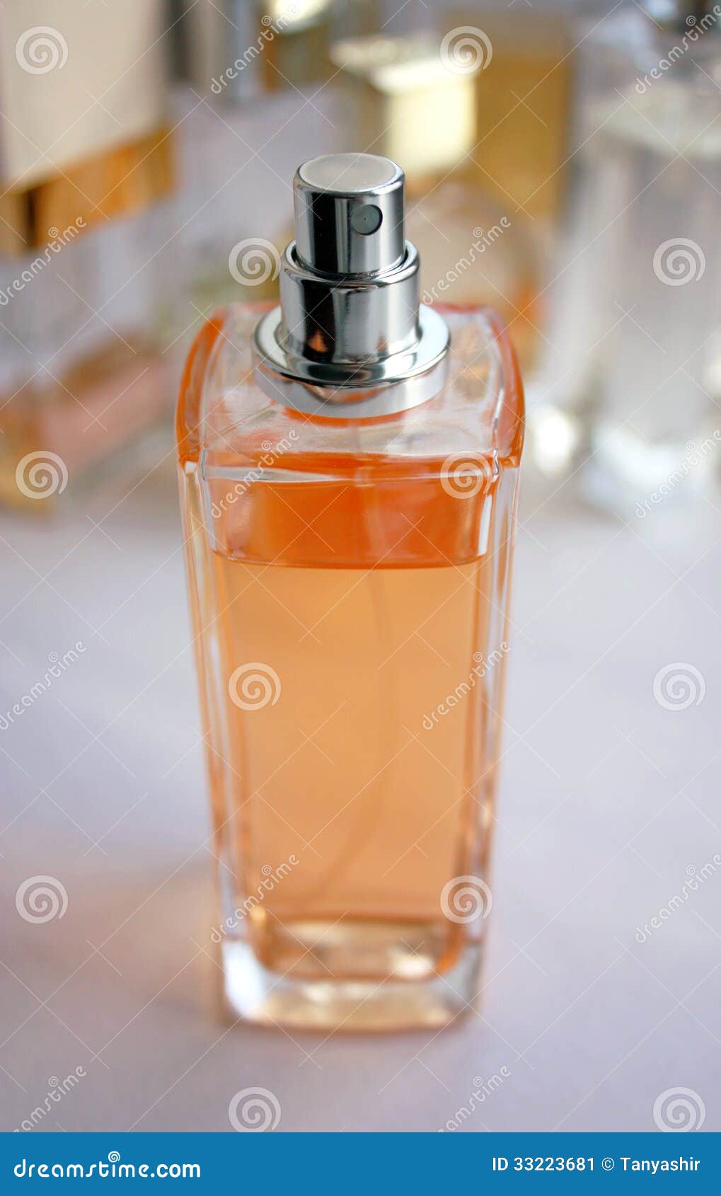 Yellow perfume bottle stock image. Image of aroma, perfume - 33223681