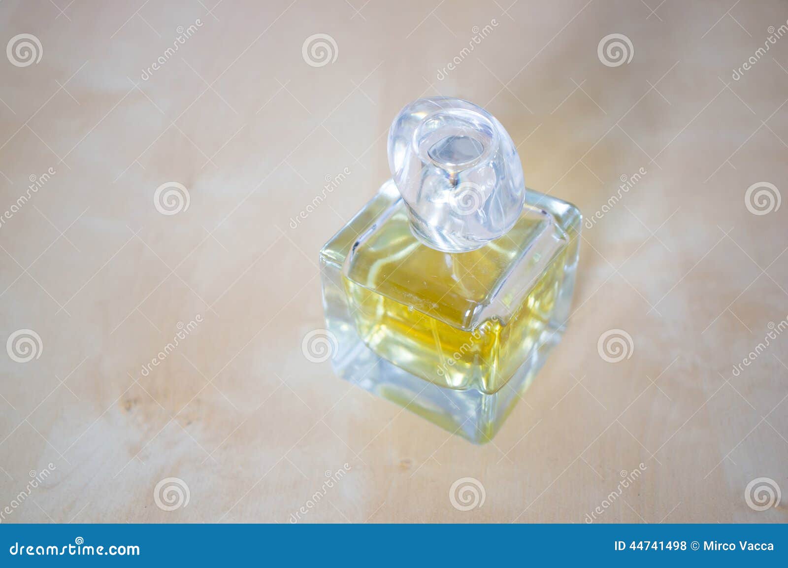 Yellow perfume bottle stock photo. Image of expensive - 44741498