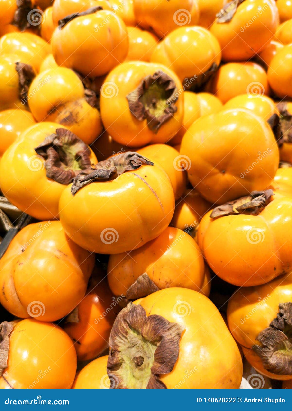 Yellow Persimmon on the Counter in the Store Stock Photo - Image of ...