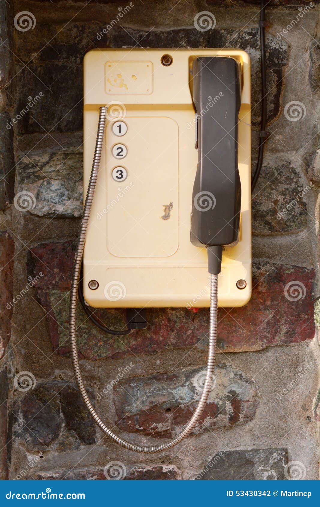 Yellow Phone with Three Numbers To Call Coastguard Stock Photo - Image ...