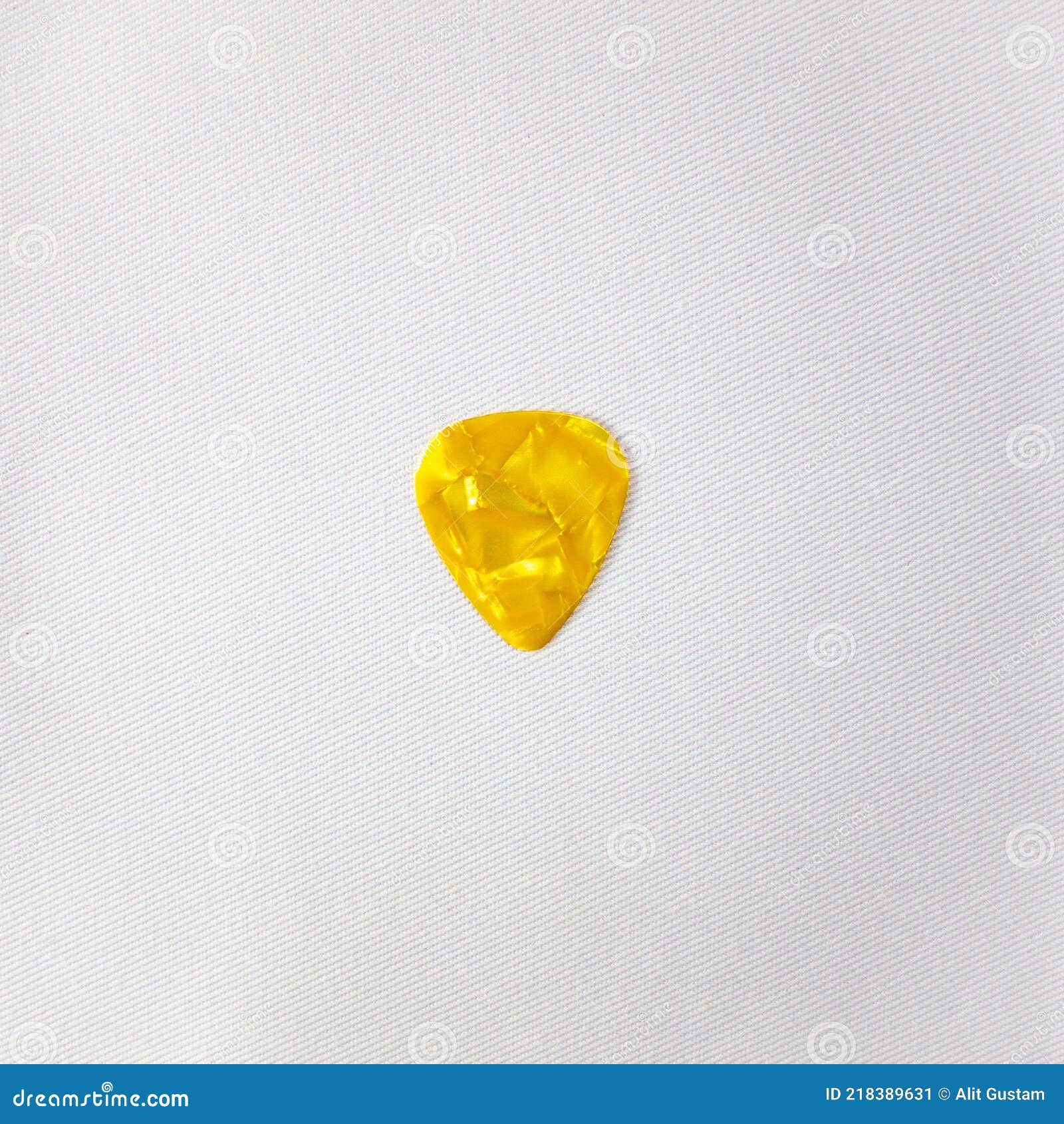 Yellow pick guitar texture stock image. Image of design - 218389631