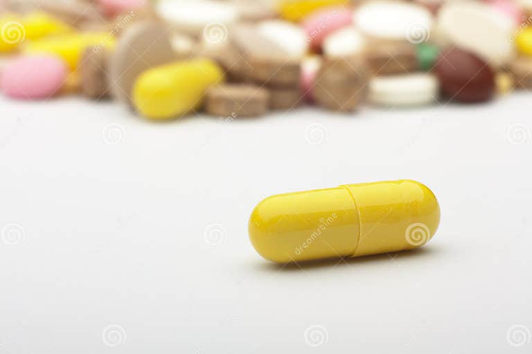Yellow pill stock photo. Image of nutritional, prescription - 22116294