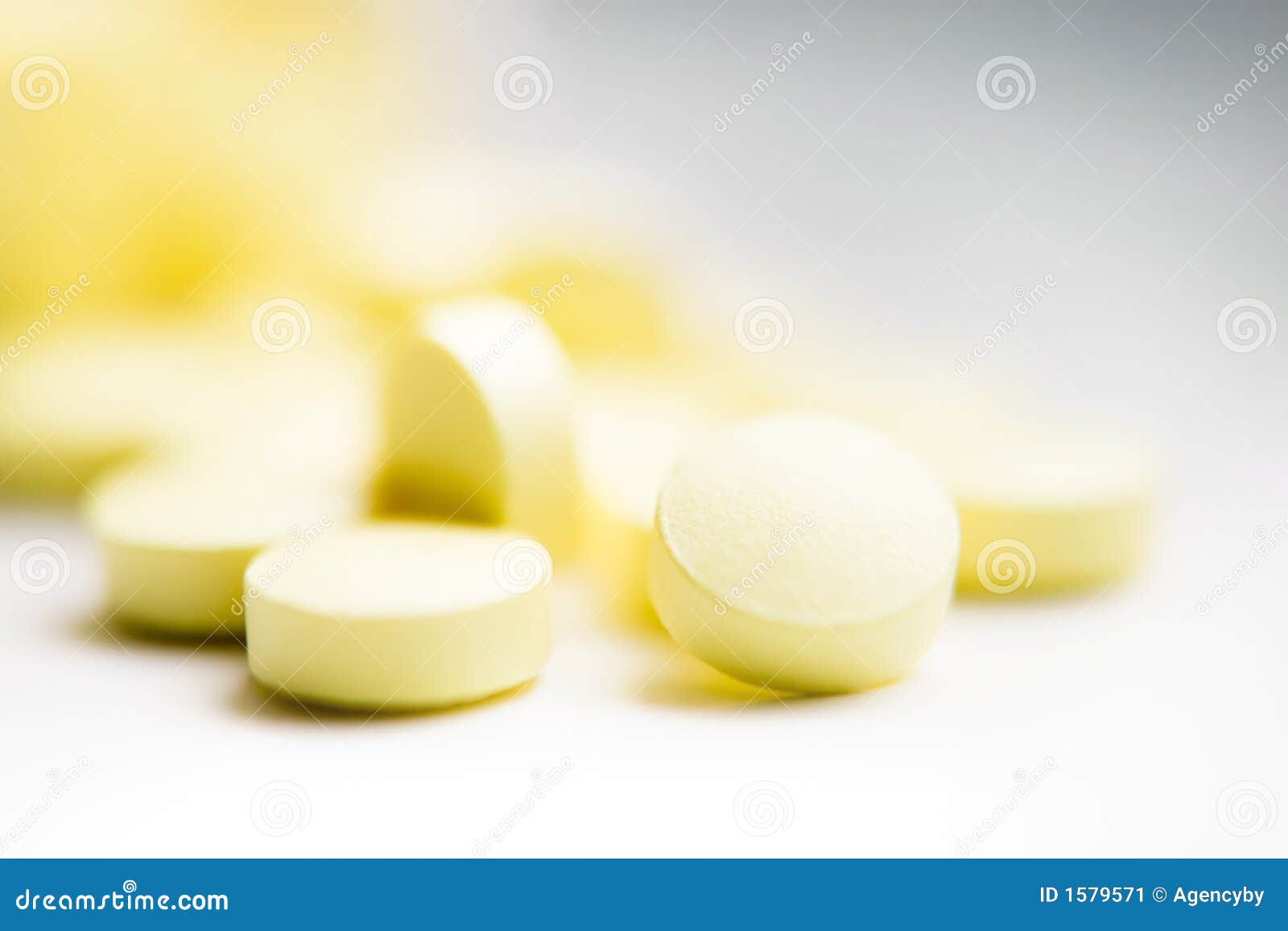 Yellow pills stock image. Image of macro, close, background - 1579571