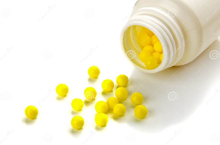 Yellow pills and bottle stock photo. Image of bottle - 40038252
