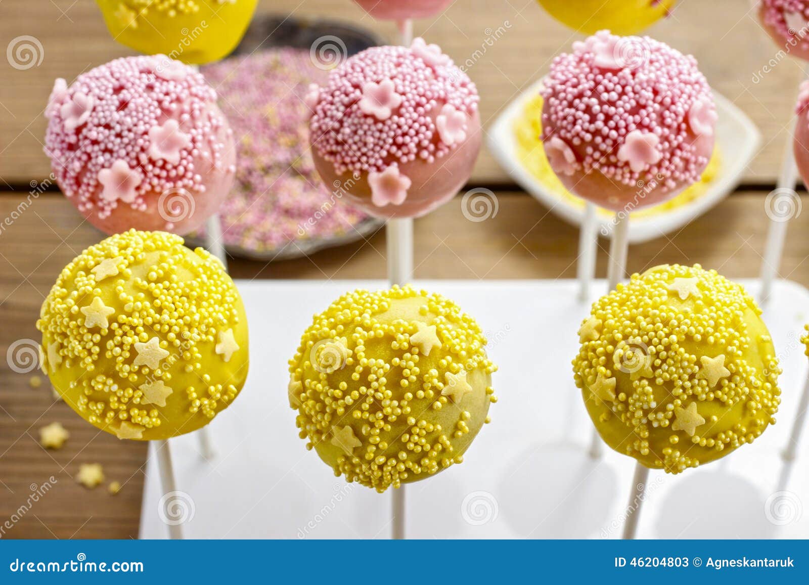 Yellow and pink cake pops stock image. Image of confectionery - 46204803