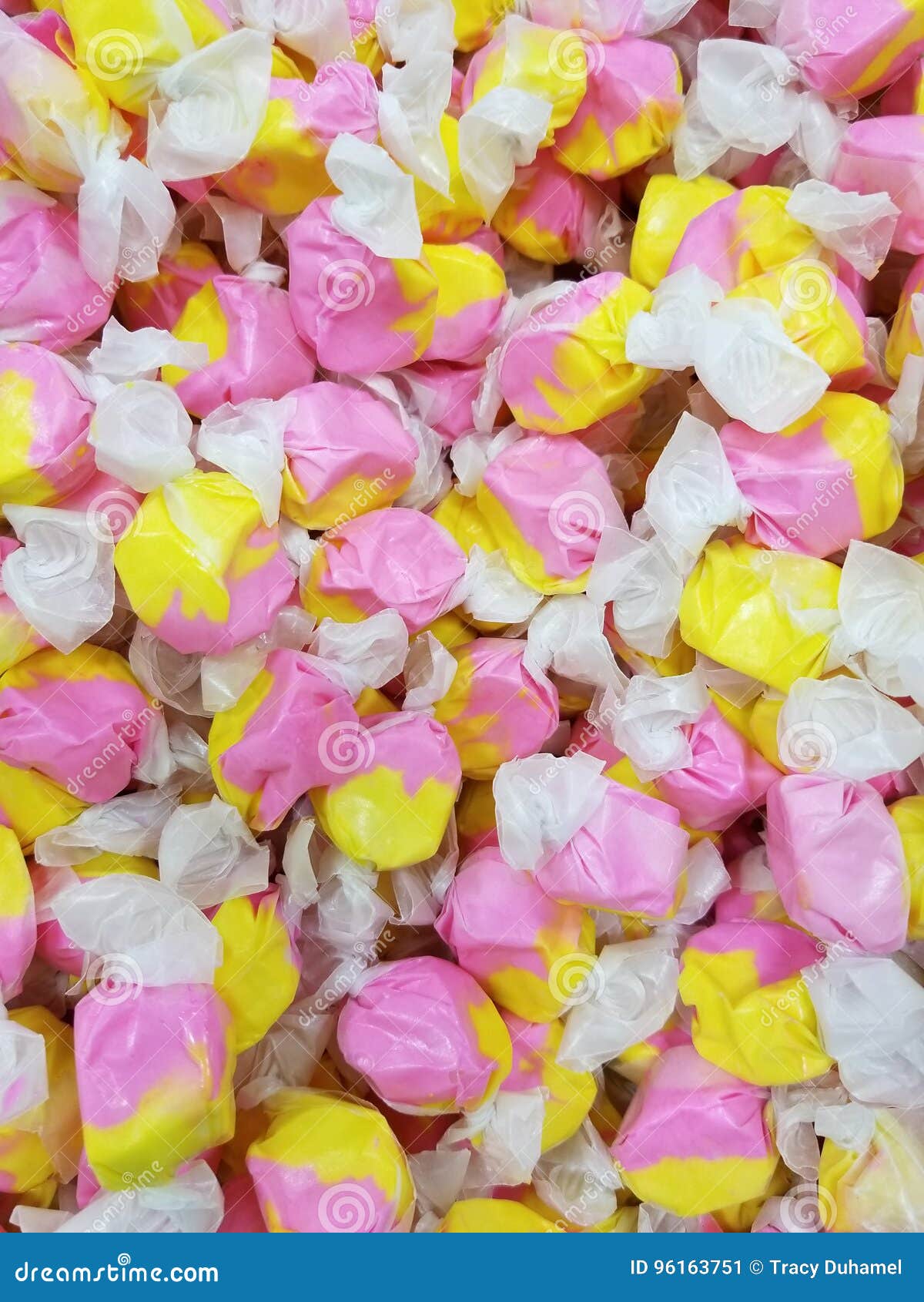 Yellow and pink candies stock image. Image of yellow - 96163751