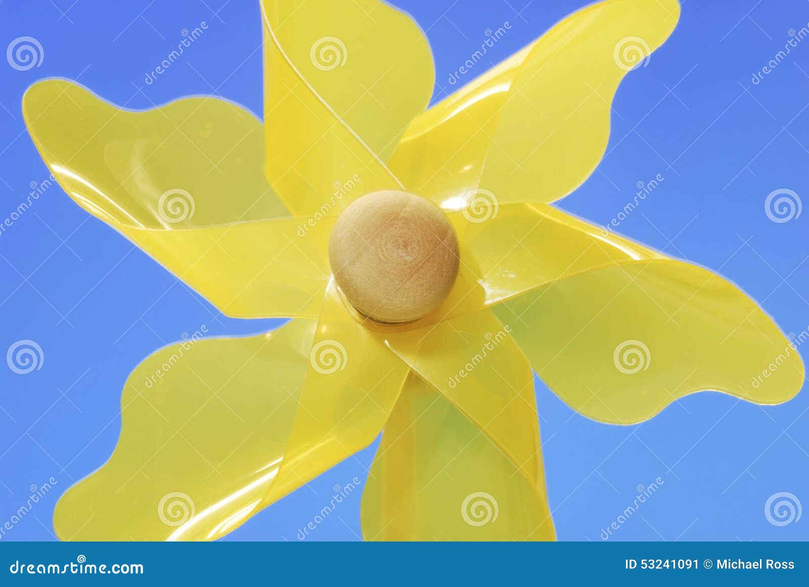 Yellow Pinwheel Closeup stock image. Image of green, colorful - 53241091