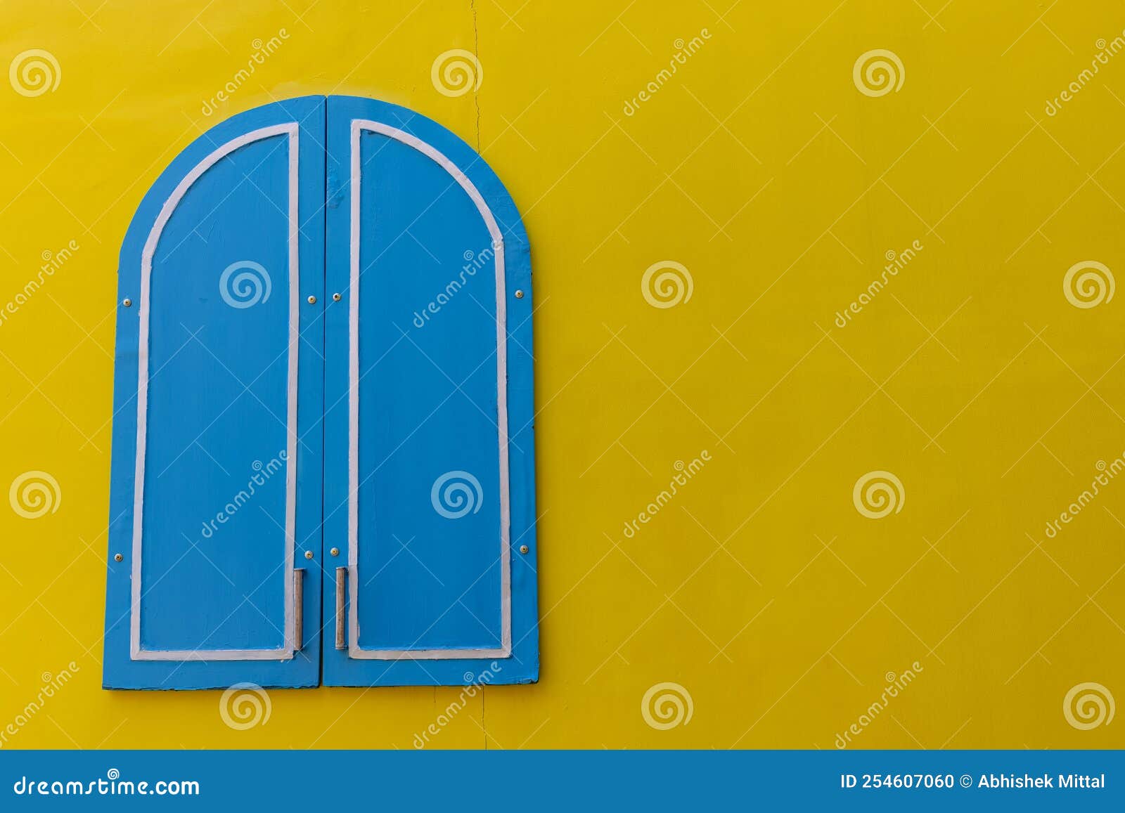 Yellow Plain Colour Wall with Colorful Object Stock Photo - Image of ...