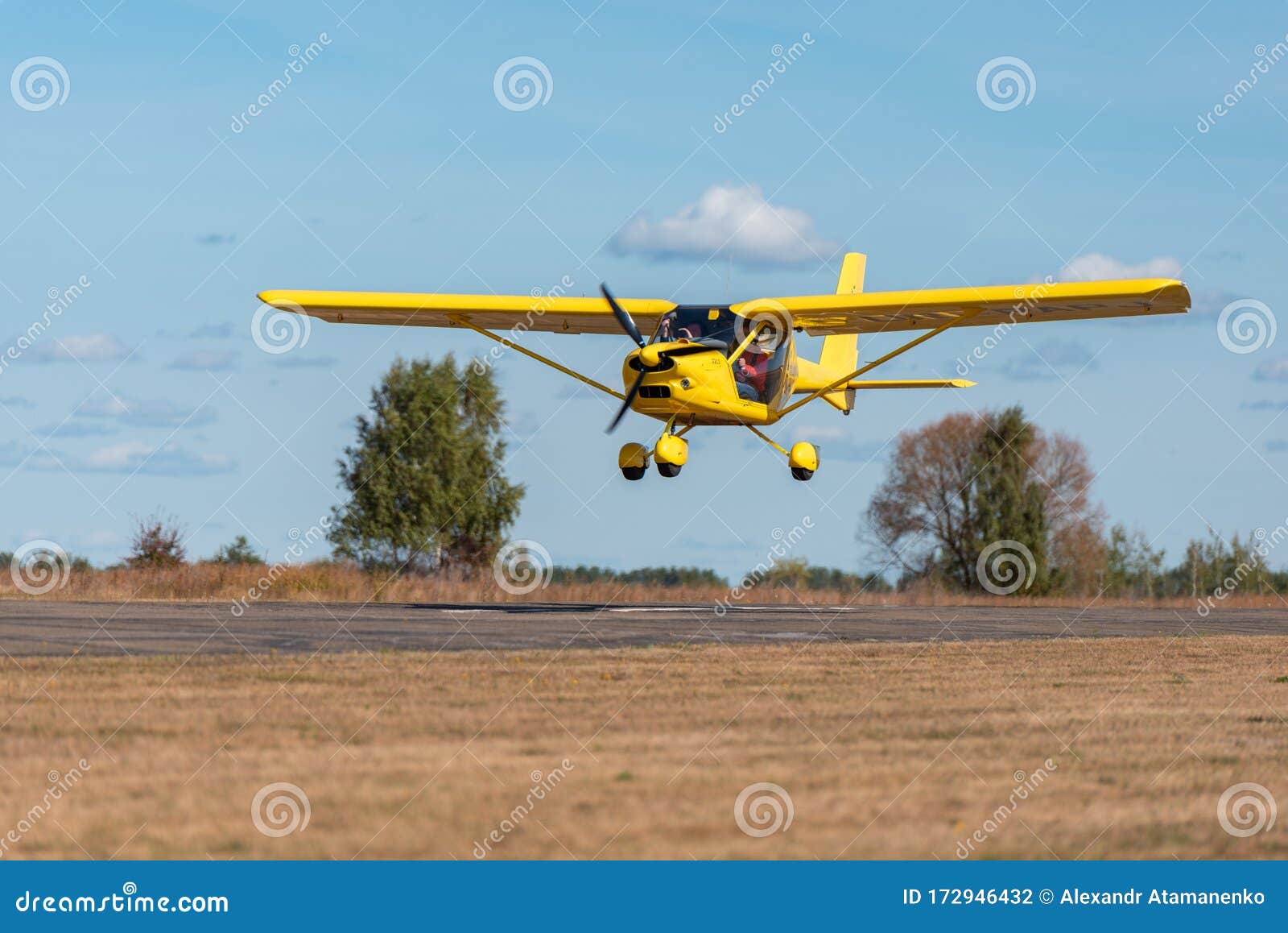 Yellow Plane Landed on the Airfield Stock Photo - Image of airfield ...