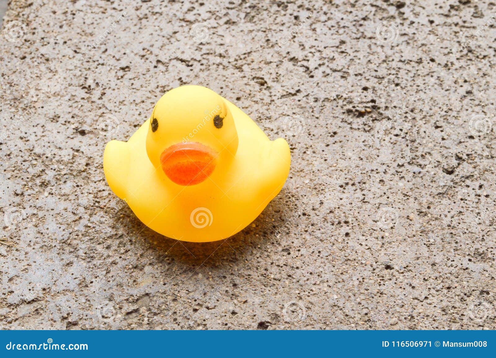 Yellow Plastic Duck Doll on Cement Floor Stock Image - Image of surface ...