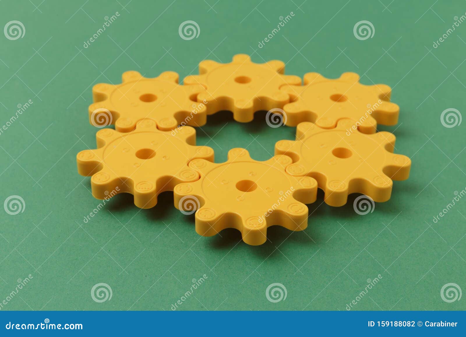 Yellow plastic gears stock photo. Image of cogwheel - 159188082