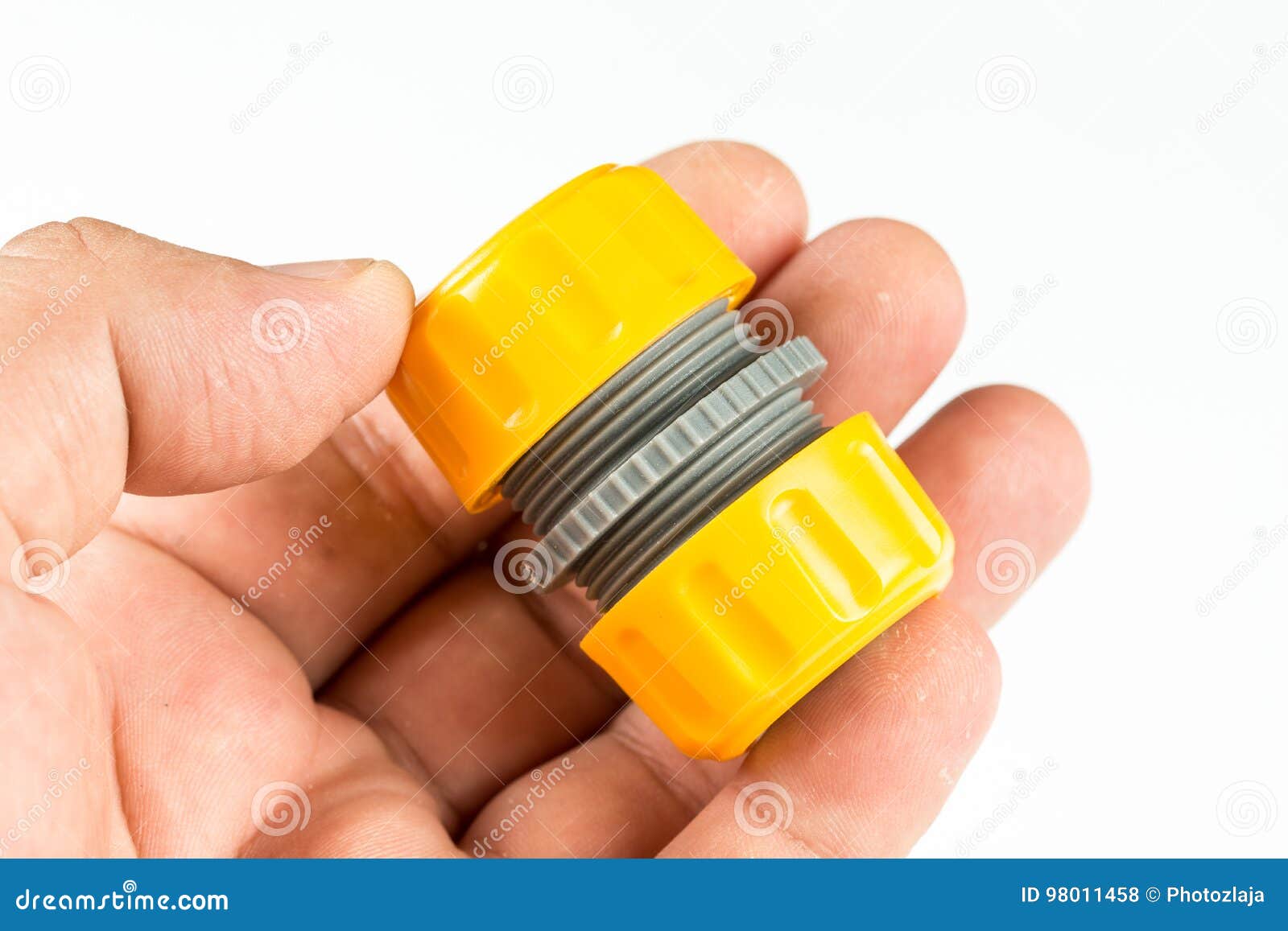 Yellow Plastic Water Hose Connectors Over White Background Stock Photo ...
