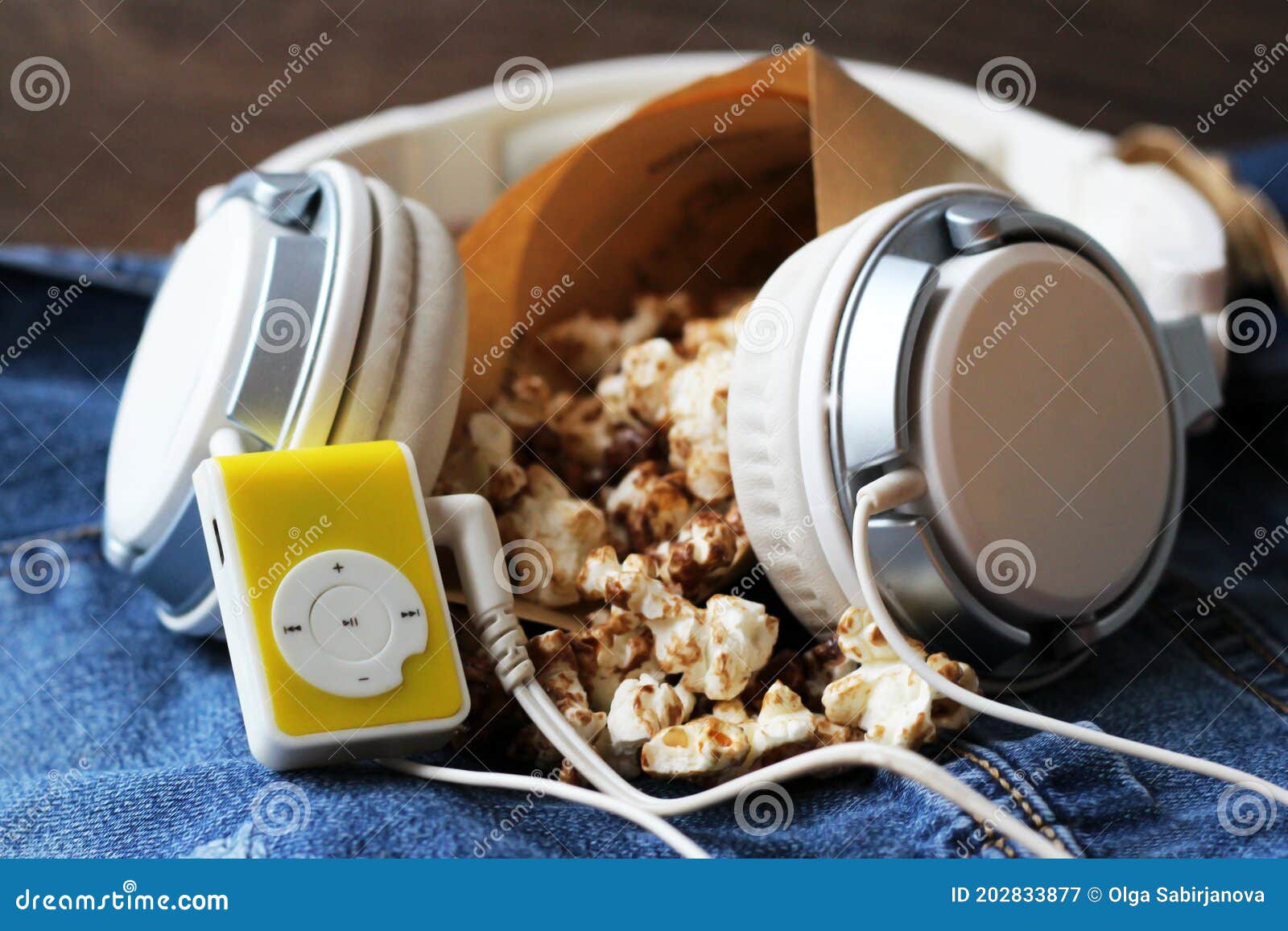 Yellow Player, White Headphones and Popcorn Stock Image - Image of ...