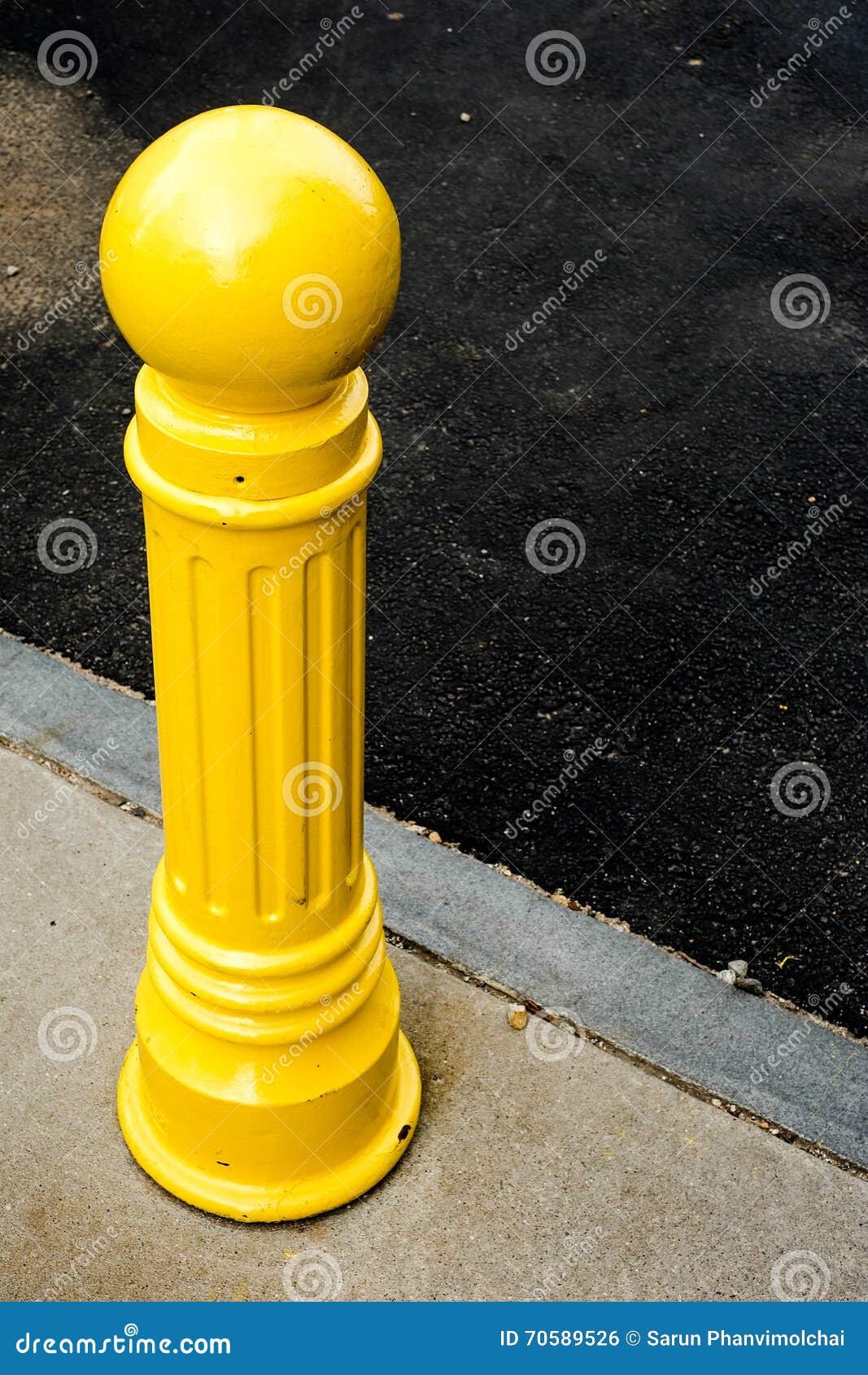 Yellow pole on the street stock photo. Image of equipment - 70589526