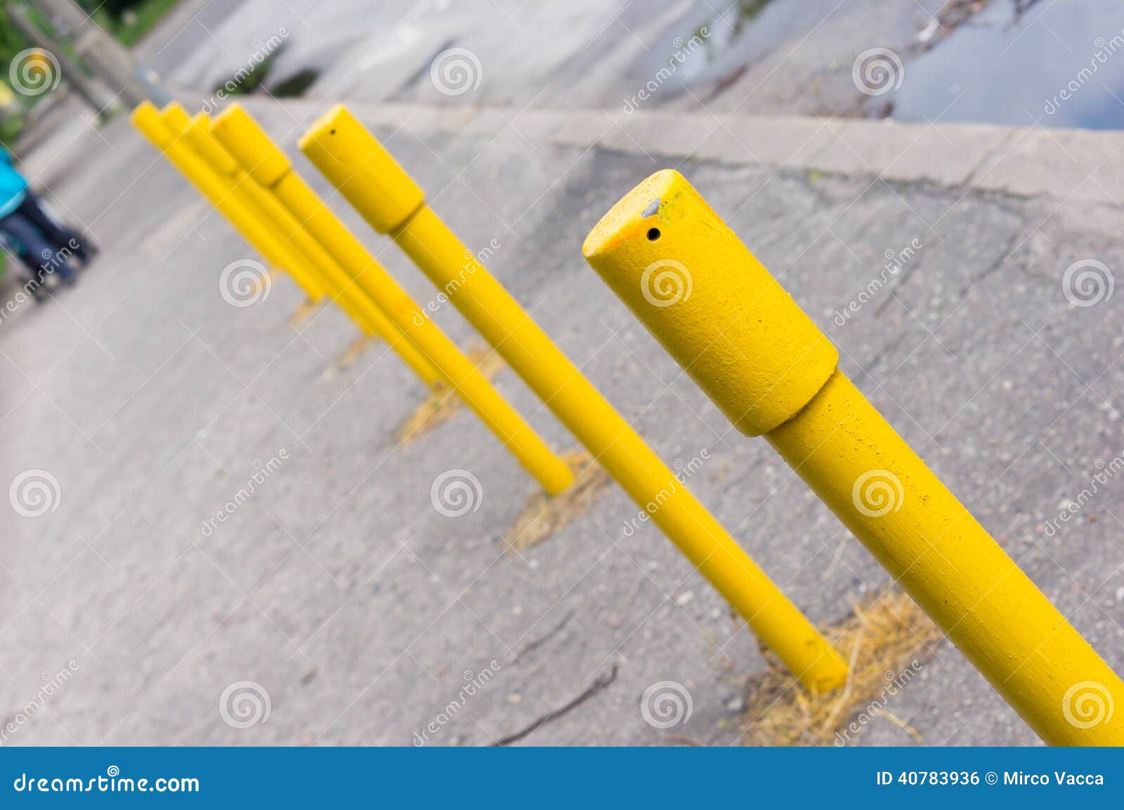 Yellow poles stock photo. Image of yellow, sidewalk, outdoor - 40783936