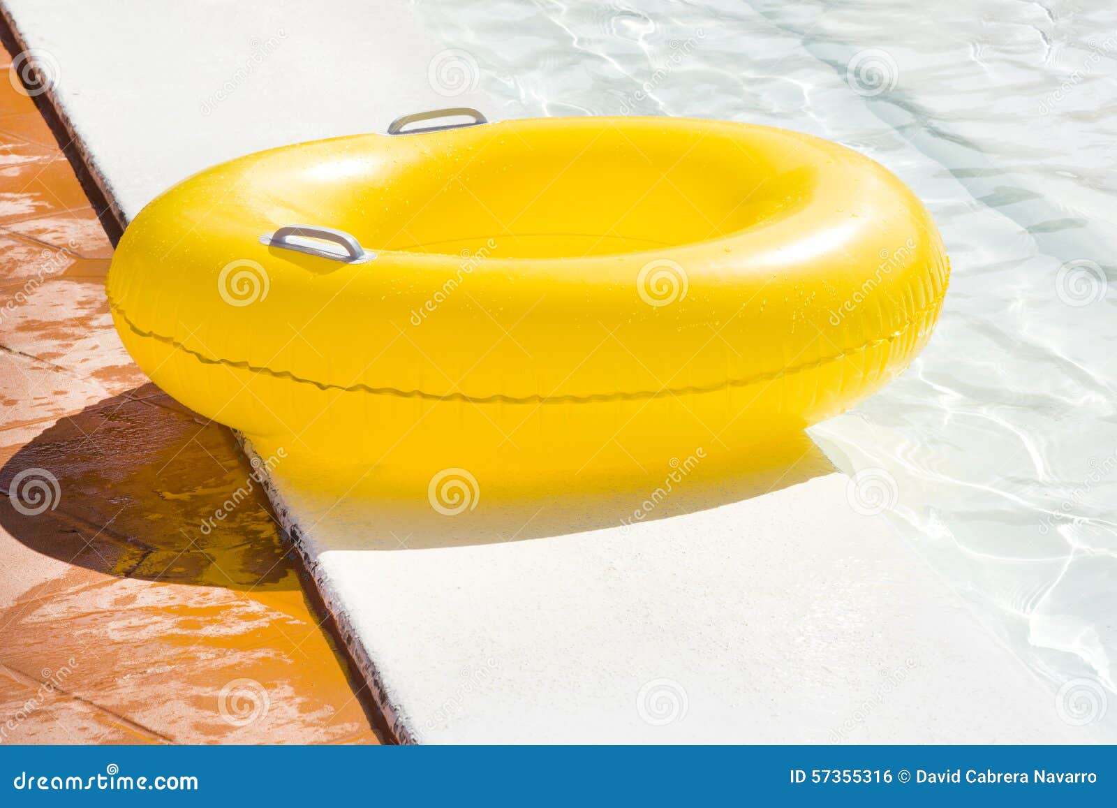 Yellow Pool Float in the Swimming Pool Stock Photo - Image of lifesaver ...