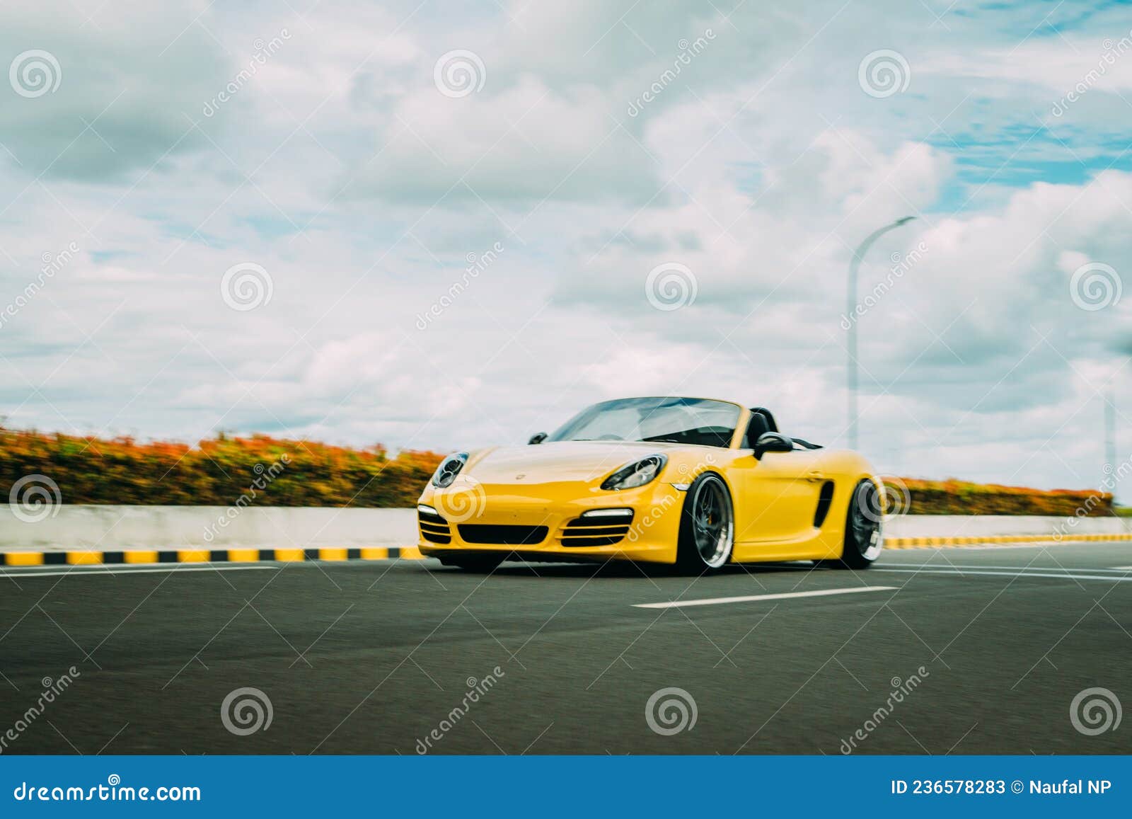 Yellow Porsche Boxster editorial stock photo. Image of convertible ...