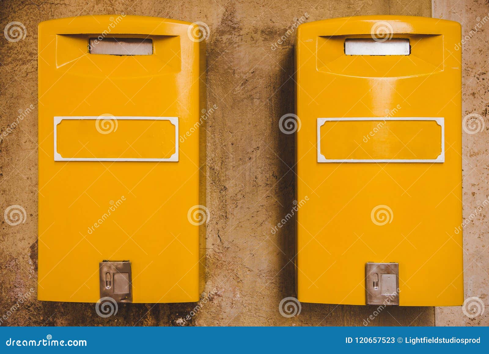 Yellow post boxes on wall stock image. Image of famous - 120657523