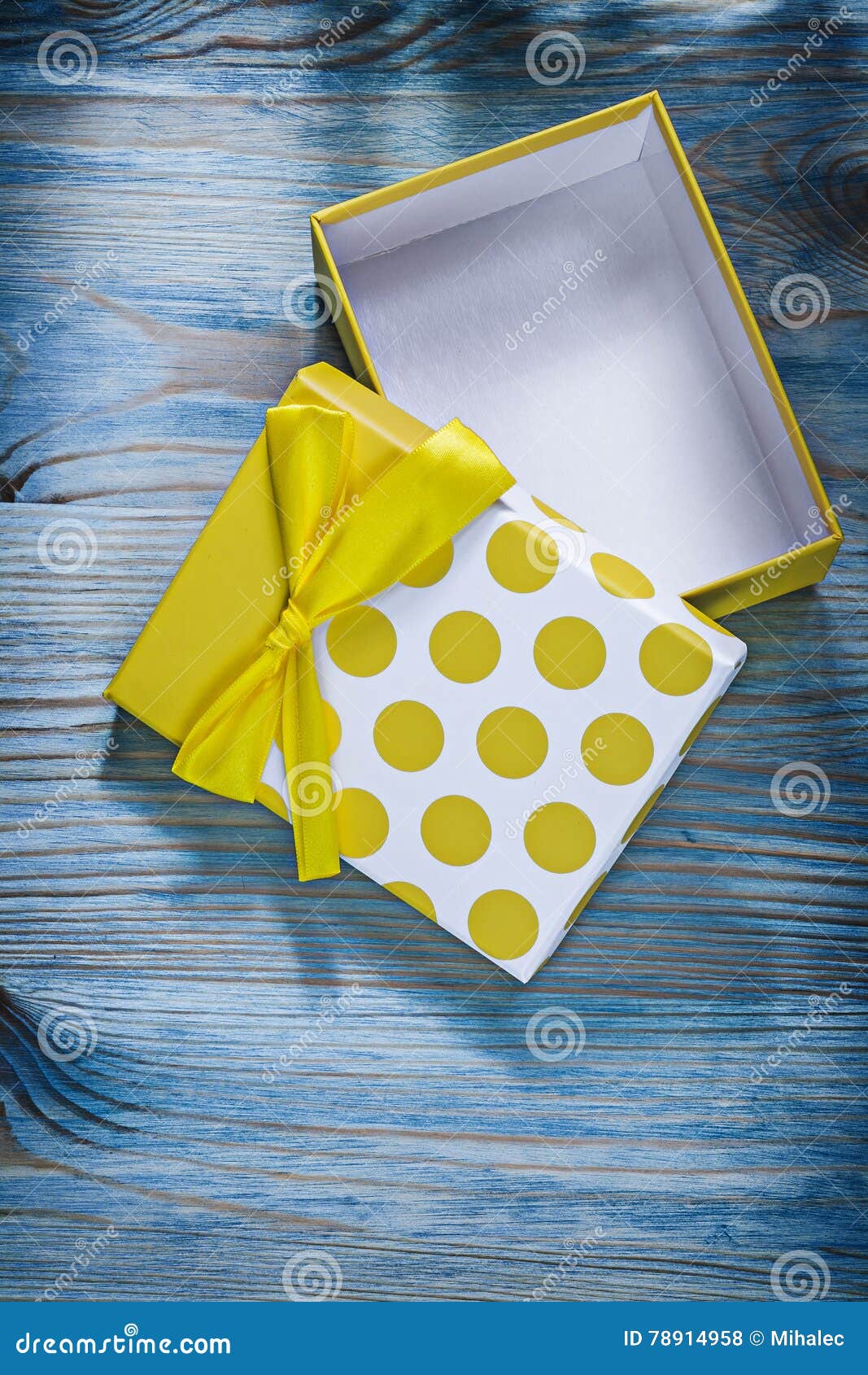 Yellow Present Box with Bow on Wooden Board Holidays Concept Stock ...