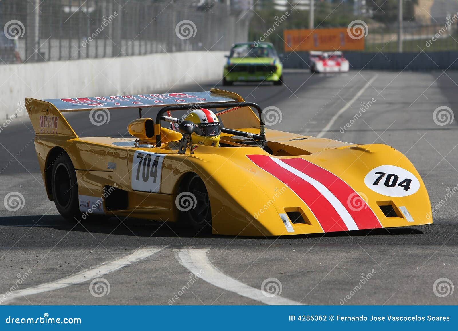 Yellow race car editorial photography. Image of corner - 4286362