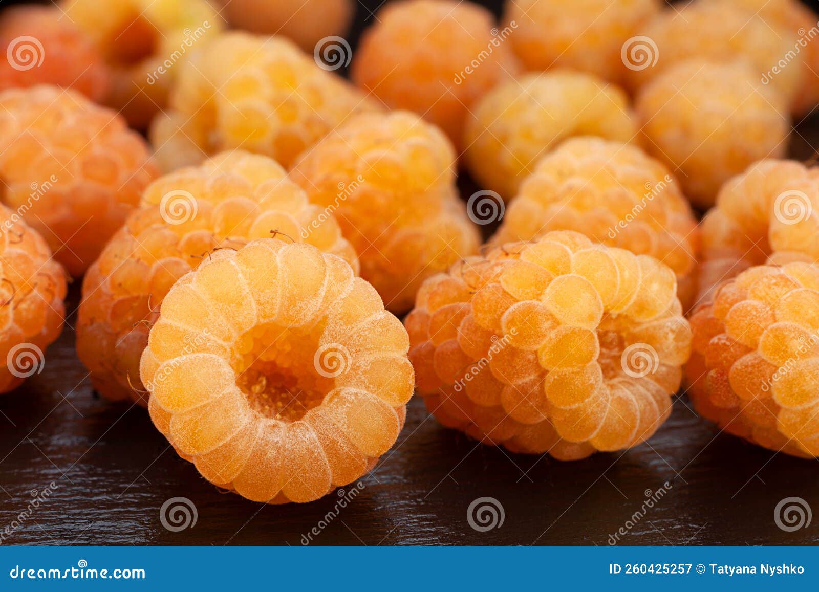 Yellow Raspberry Berries on Black Stock Image - Image of fruit, leaf ...