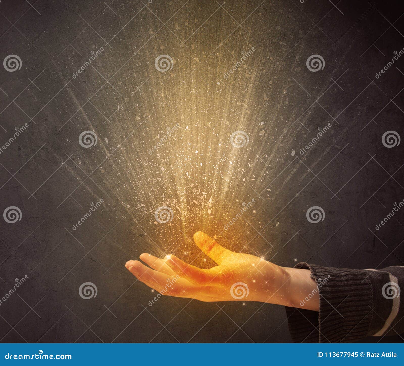 Hand holding yellow light stock image. Image of generosity - 113677945
