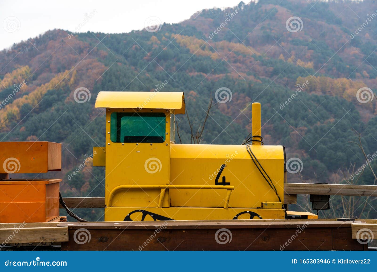 Yellow Realistic Miniature Toy Train in a Railway Stock Photo - Image ...