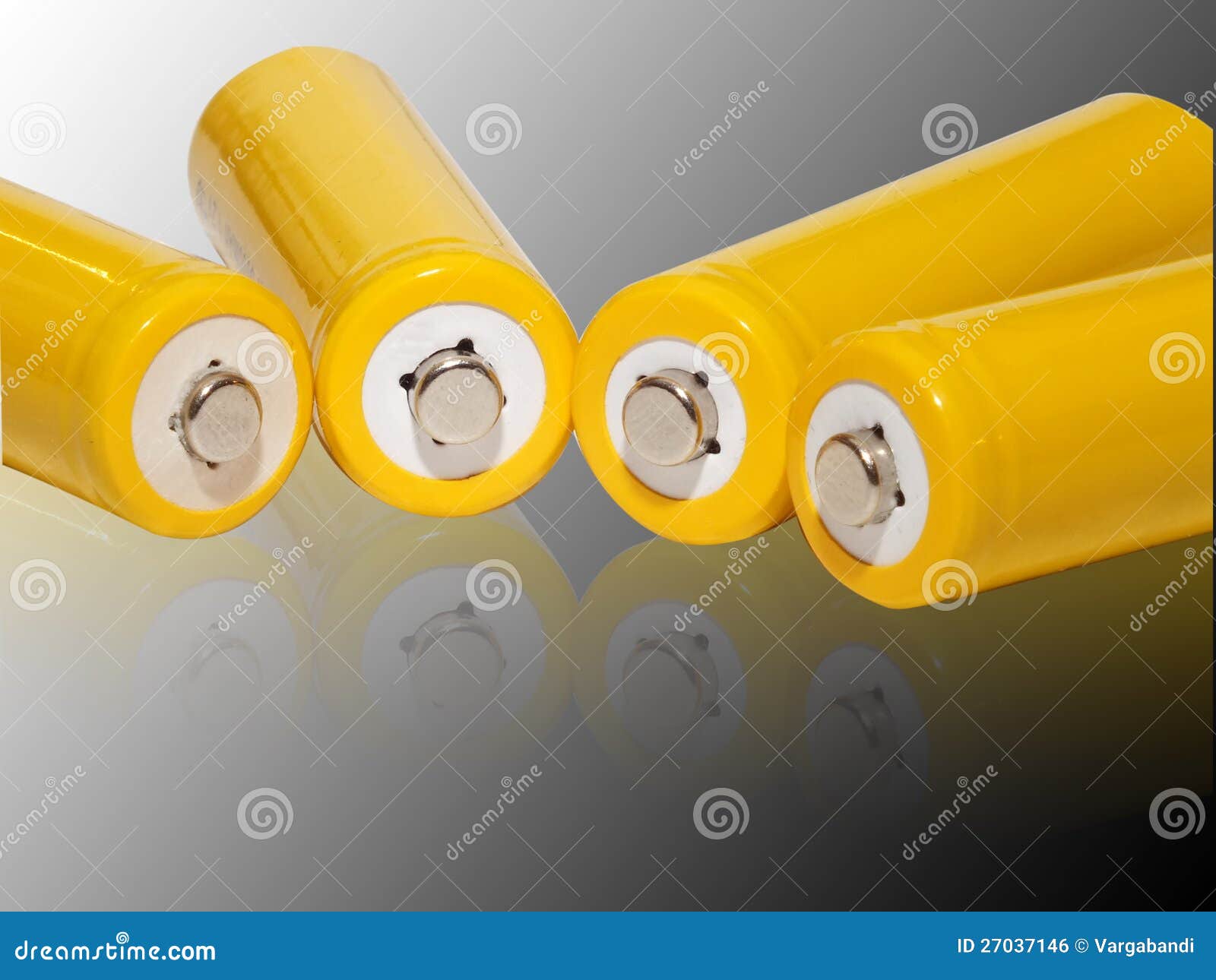 Yellow Rechargeable Batteries Stock Photo - Image of contacts ...