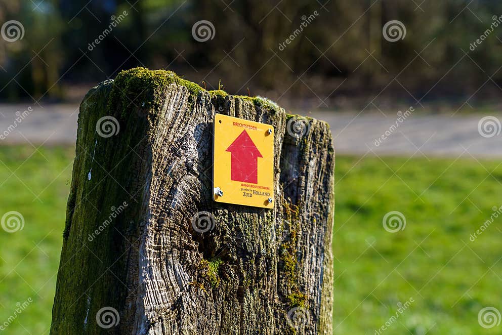 Yellow Rectangular-shaped Sign with a Red Arrow Pointing Up Stock Image ...