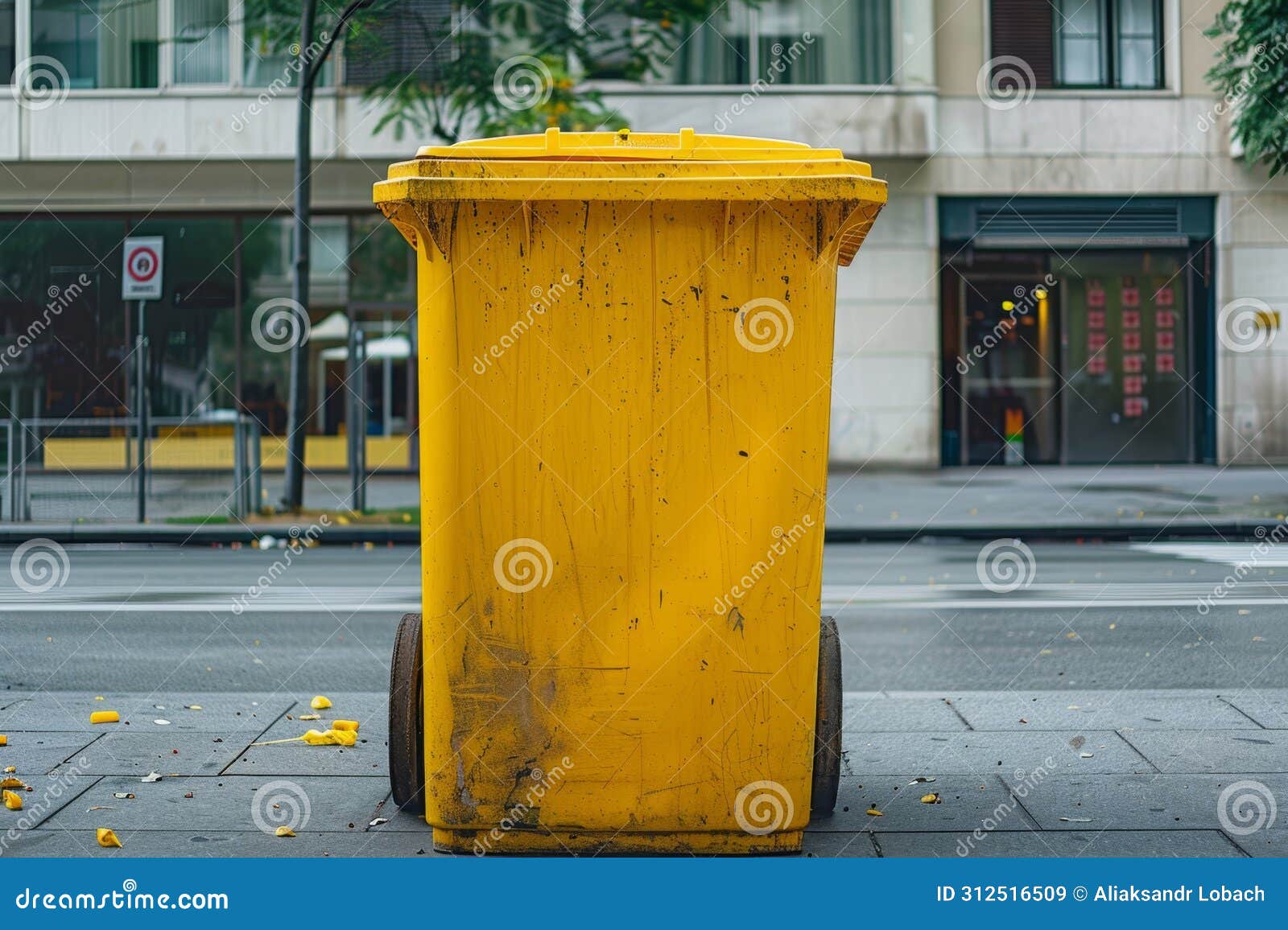 A Yellow Recycling Container is on the Street Stock Image - Image of ...