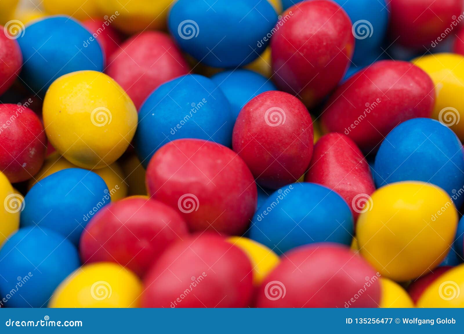 Yellow, Red and Blue Goodies Stock Image - Image of sugar, depth: 135256477